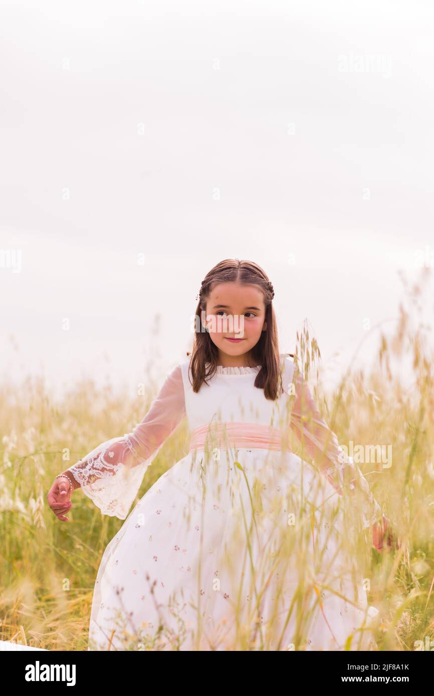 religious catholic child celebration. Hispanic girl in communion ...