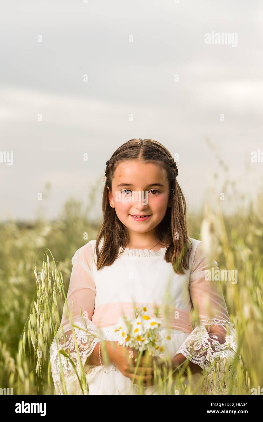 religious catholic child celebration. Hispanic girl in communion ...