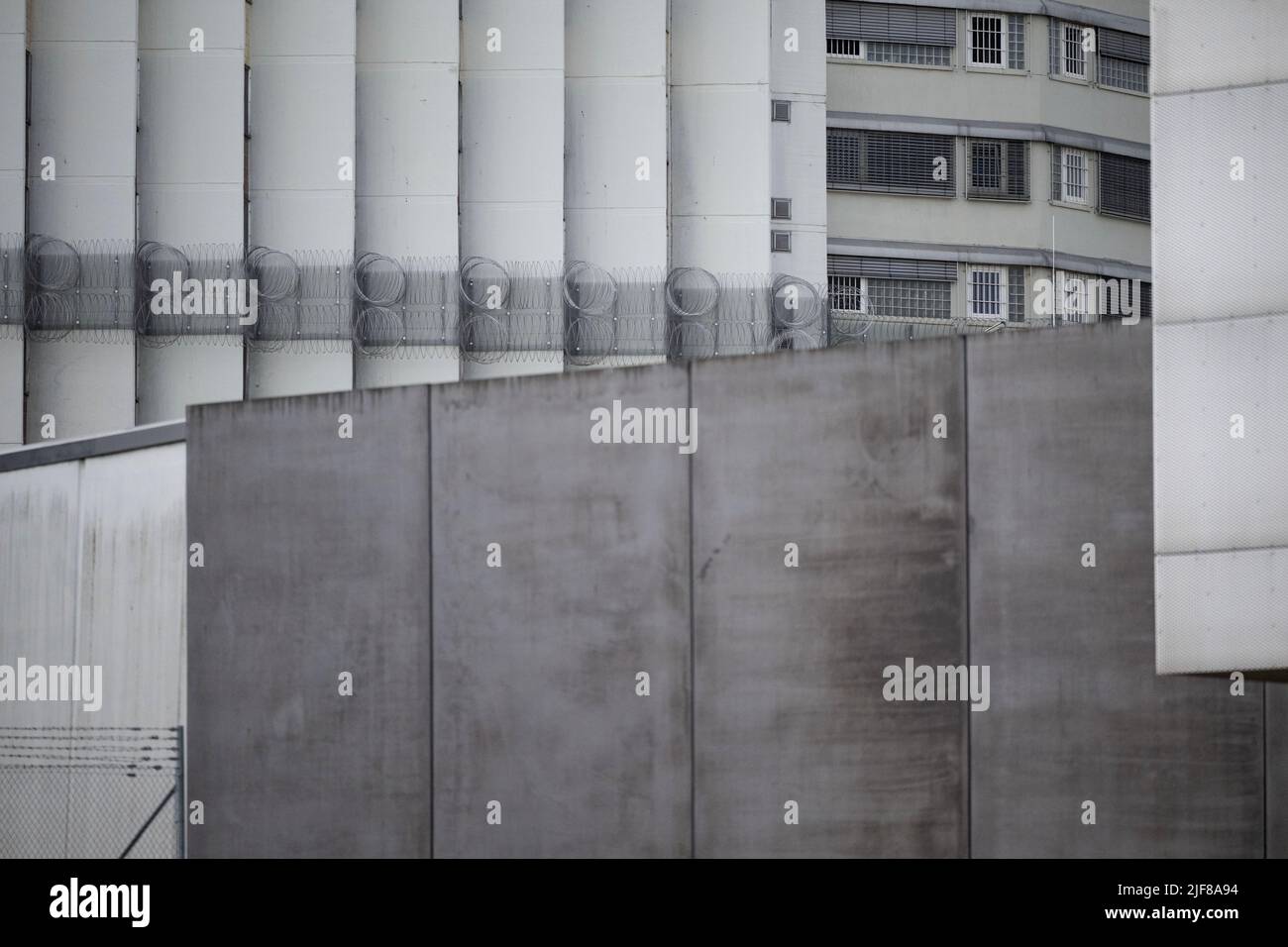 Stuttgart, Germany. 30th June, 2022. NATO wire is seen on a fence at ...