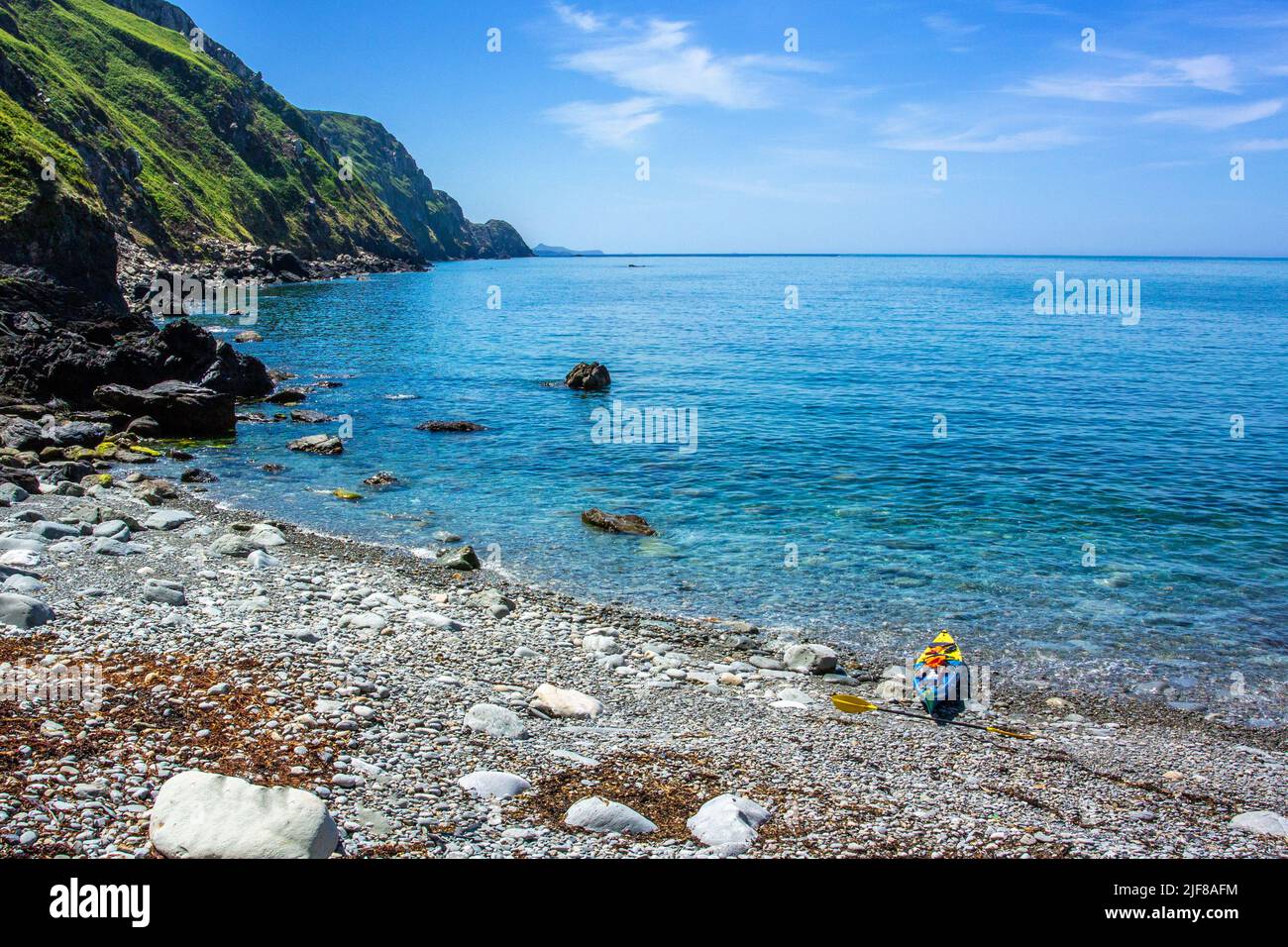 Sea kayak on beach, Pwll Deri on the Pembrokeshire Coast, Wales Stock ...