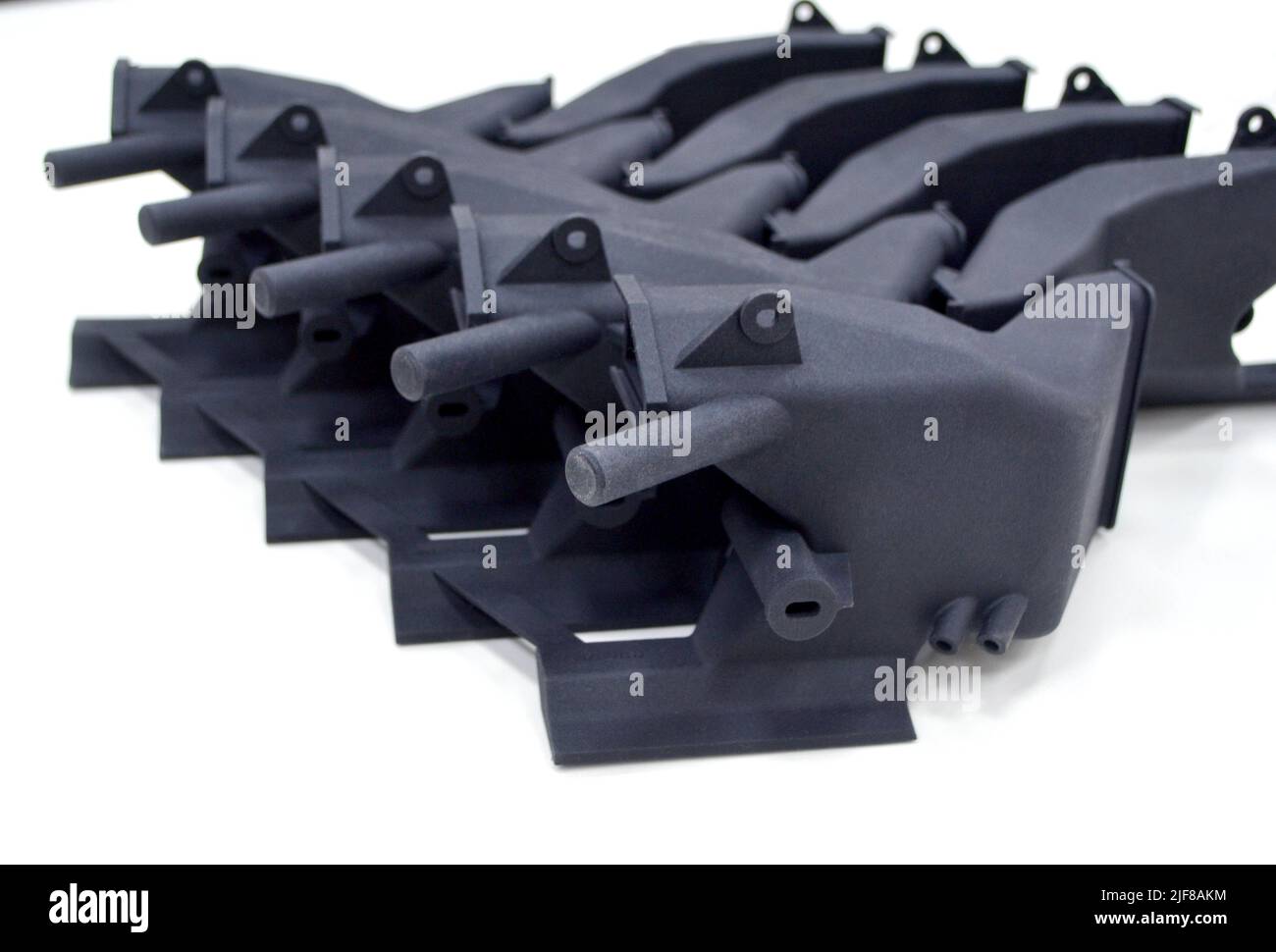 Models printed on 3D printer isolated on white background. Objects ...