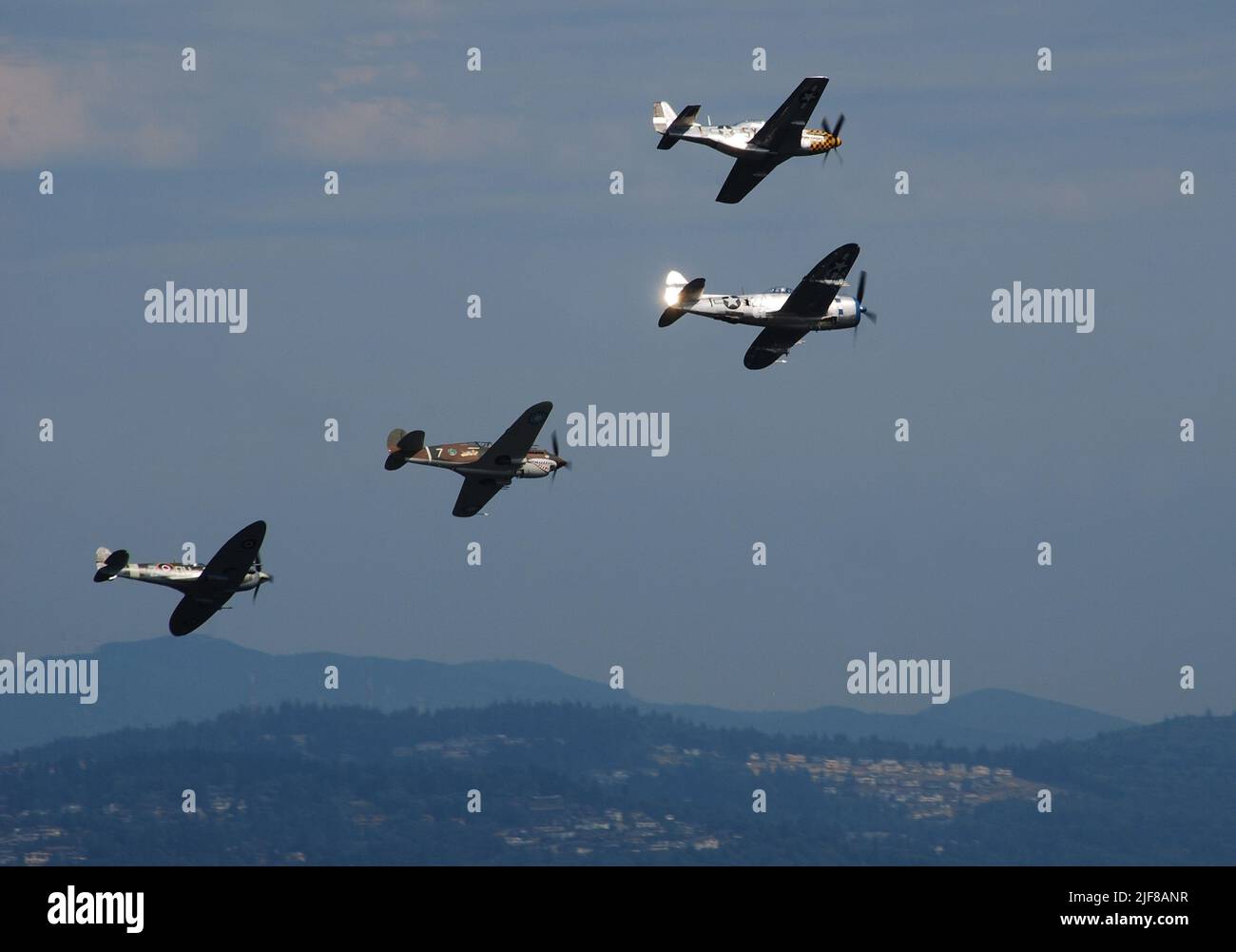 World War II restored fighter planes in flight Stock Photo - Alamy