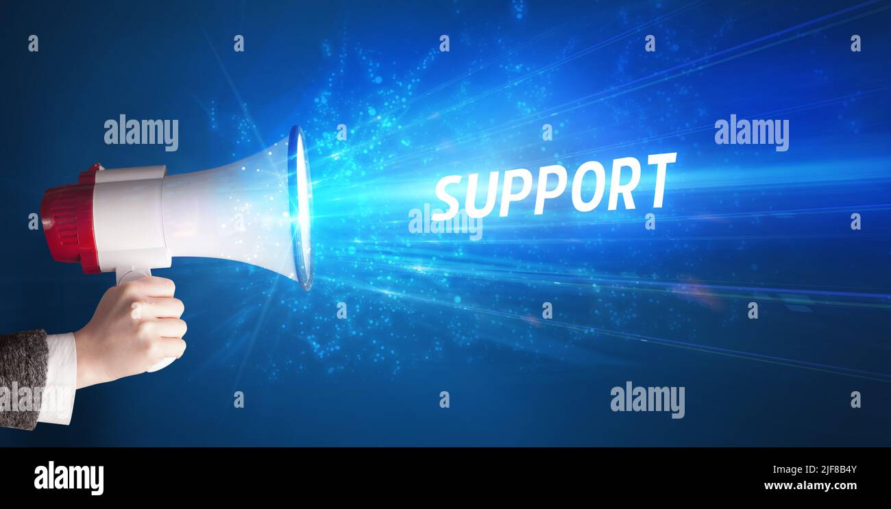 Young person shouting in loudspeaker Stock Photo - Alamy