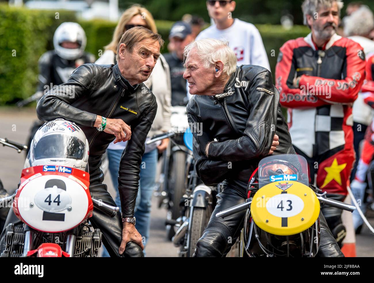 Goodwood, UK. 26th June, 2022. Stuart Graham and Sammy Miller chat in ...