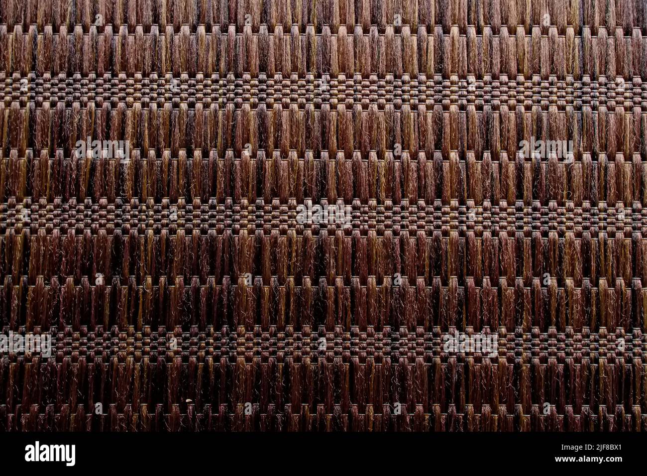 Wicker background made of natural straw. Full frame of densely woven ...
