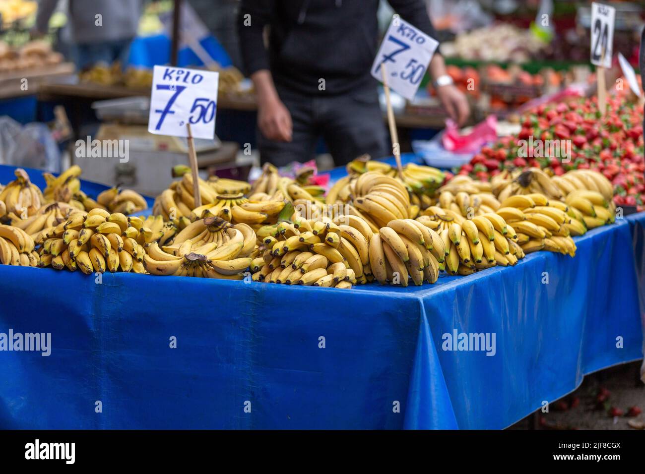 Fresh and local bananas for sale at the market Stock Photo - Alamy