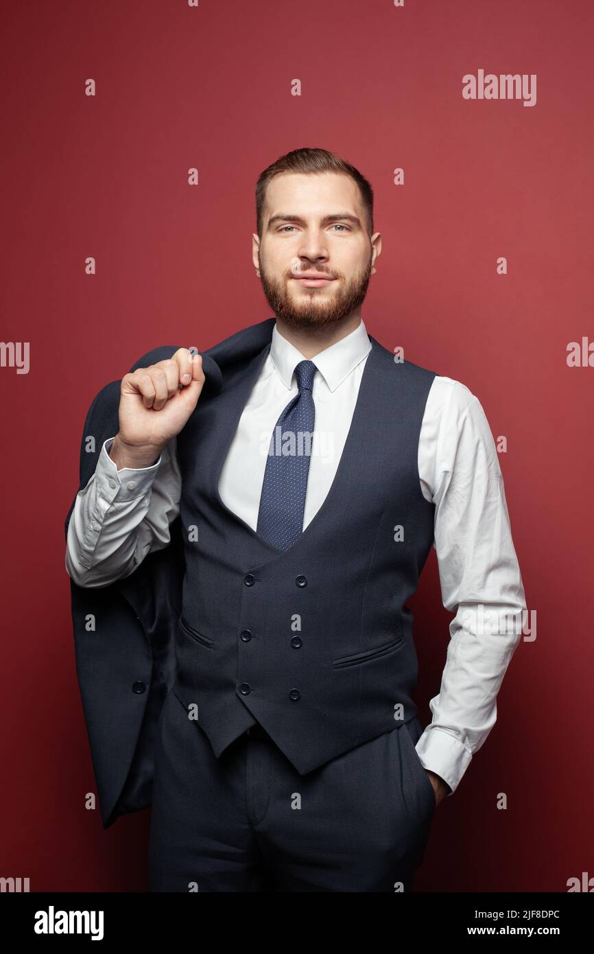 Portrait of a stylish corporate executive smiling confidently at the ...