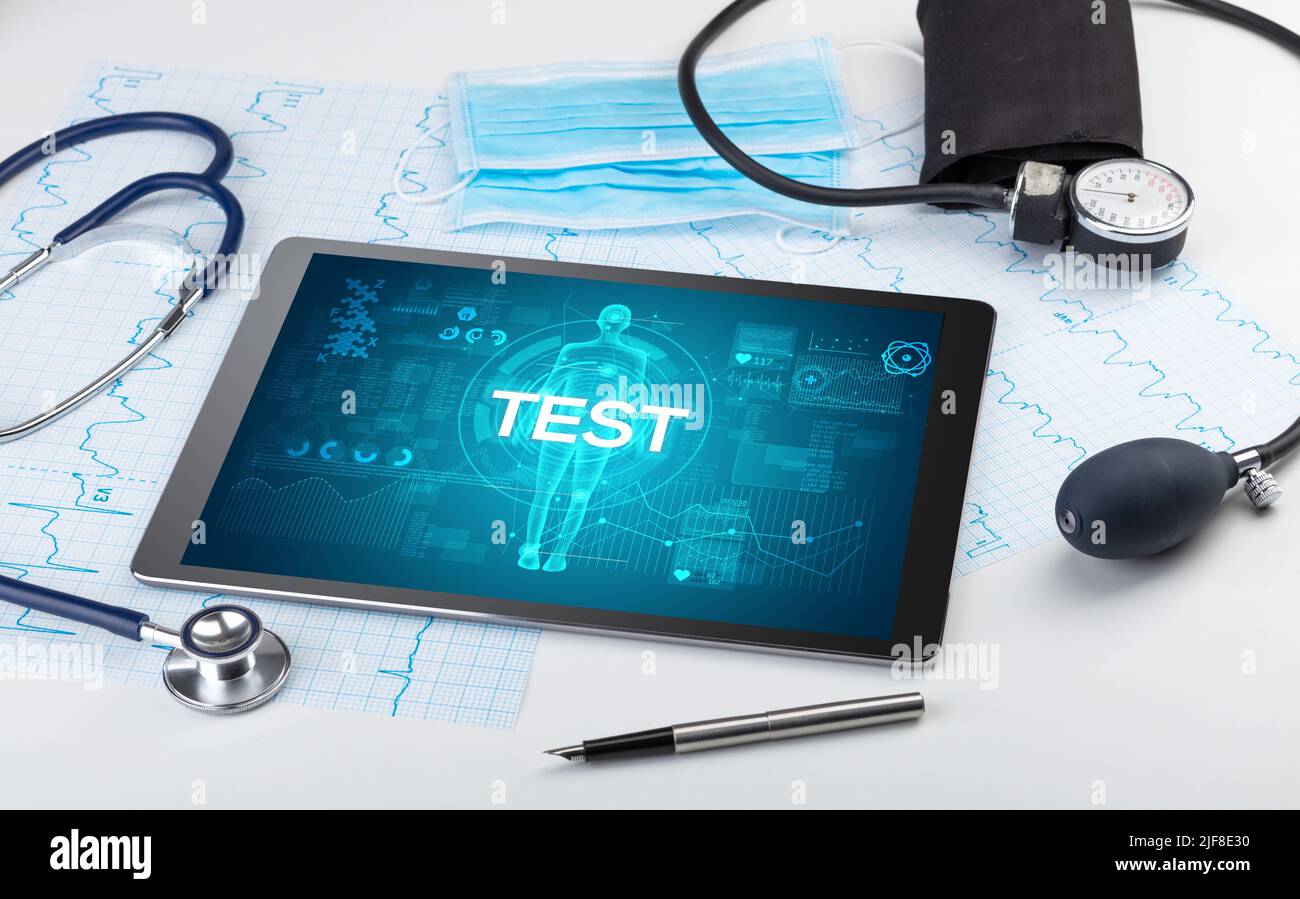 Tablet pc and doctor tools Stock Photo - Alamy