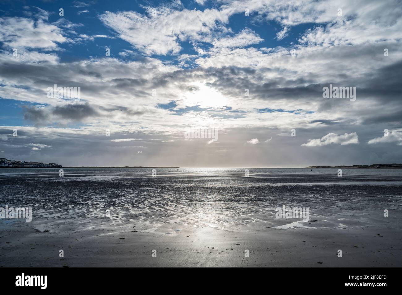 Sunset over Instow beach looking towards Northam in North Devon in late ...