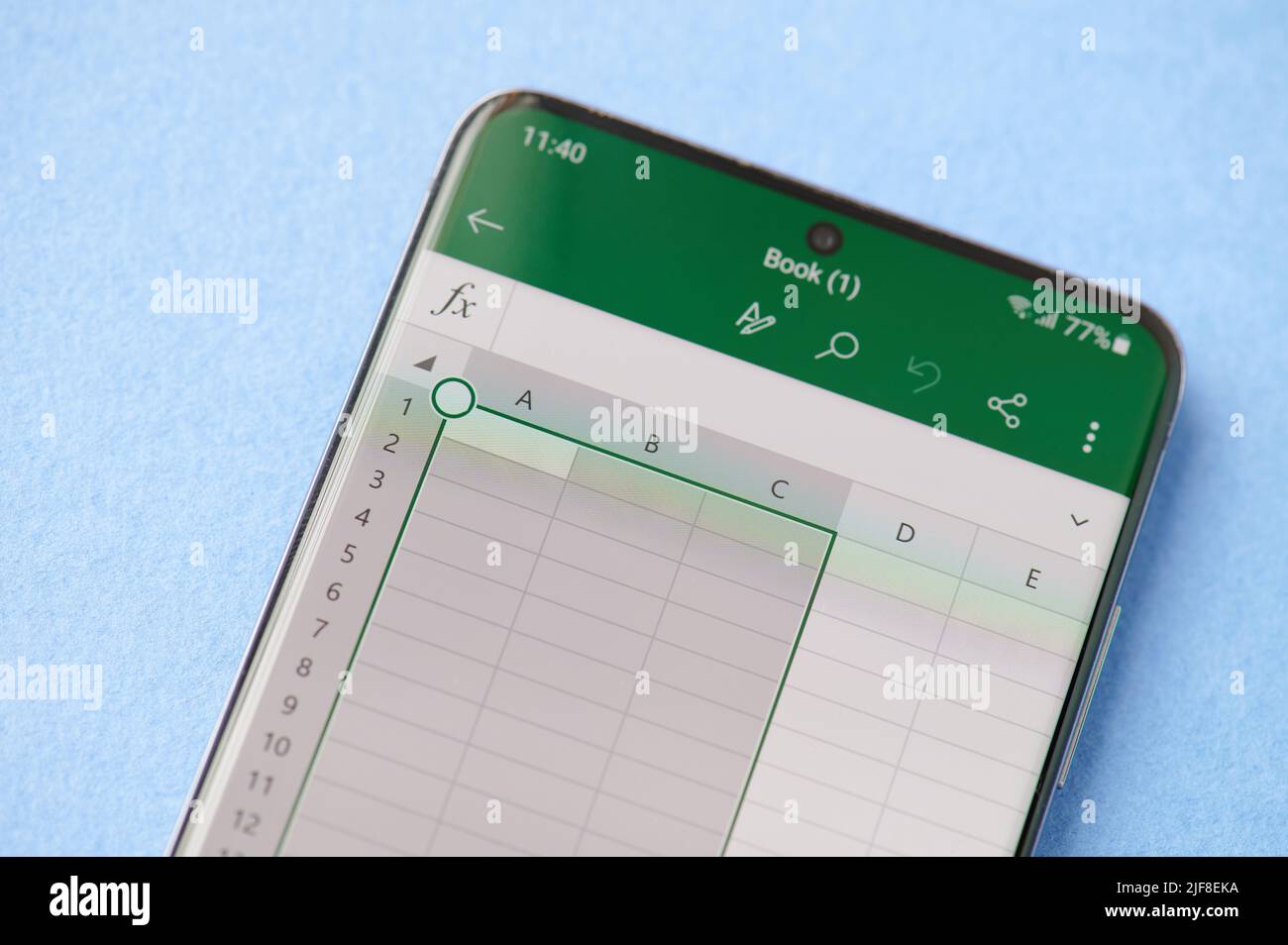New york, USA - June 28 2021: Merging cells in excel app on smartphone ...