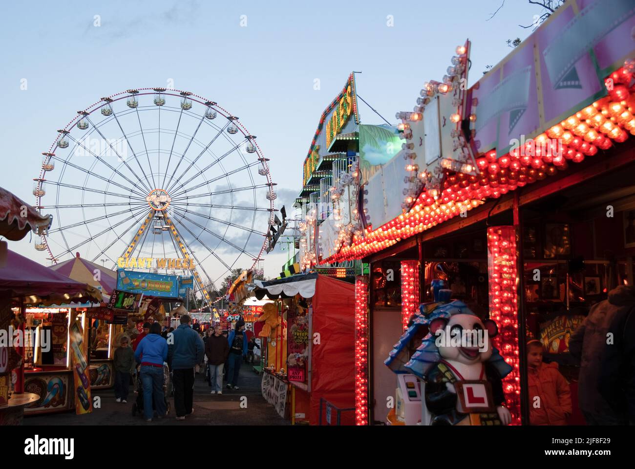 Fairground rides at night Stock Photo - Alamy