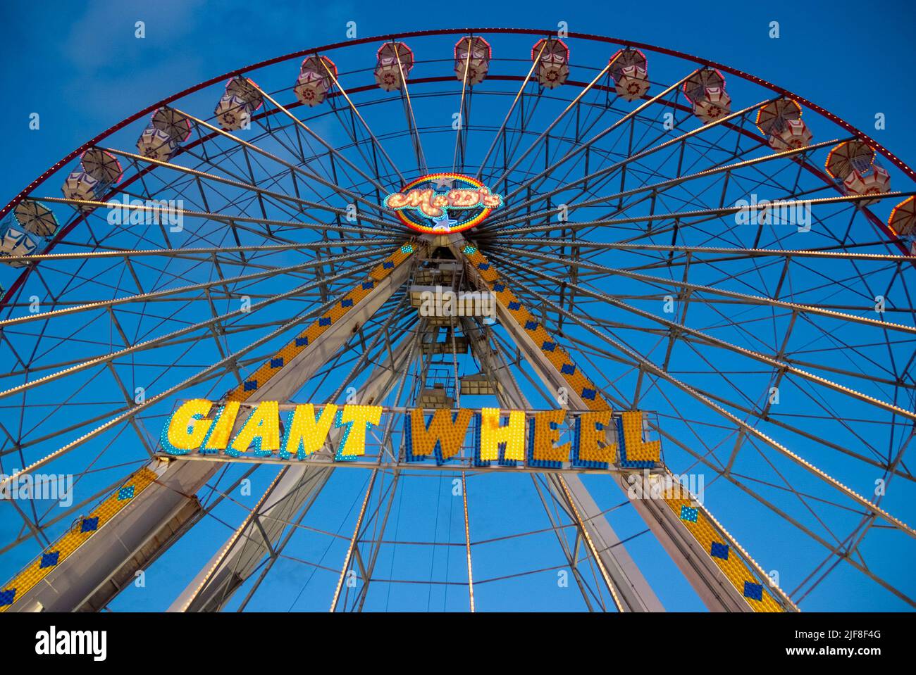 Fairground rides at night Stock Photo - Alamy