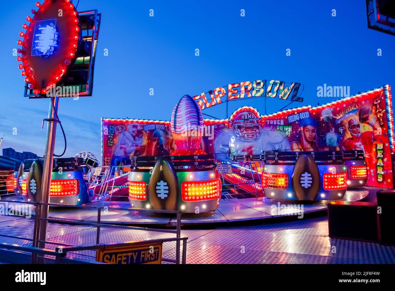 Fairground rides at night Stock Photo - Alamy