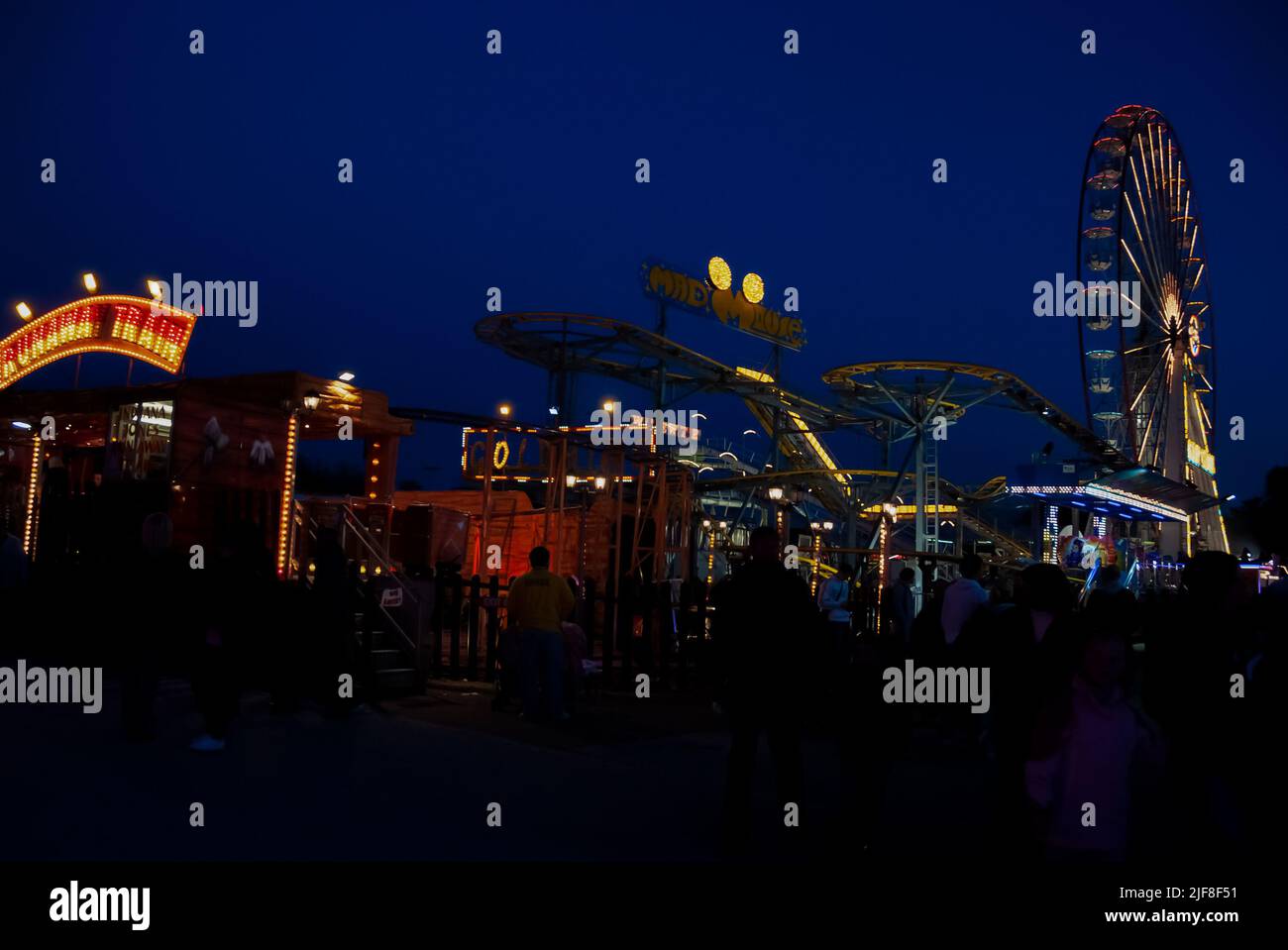 Fairground rides at night Stock Photo - Alamy