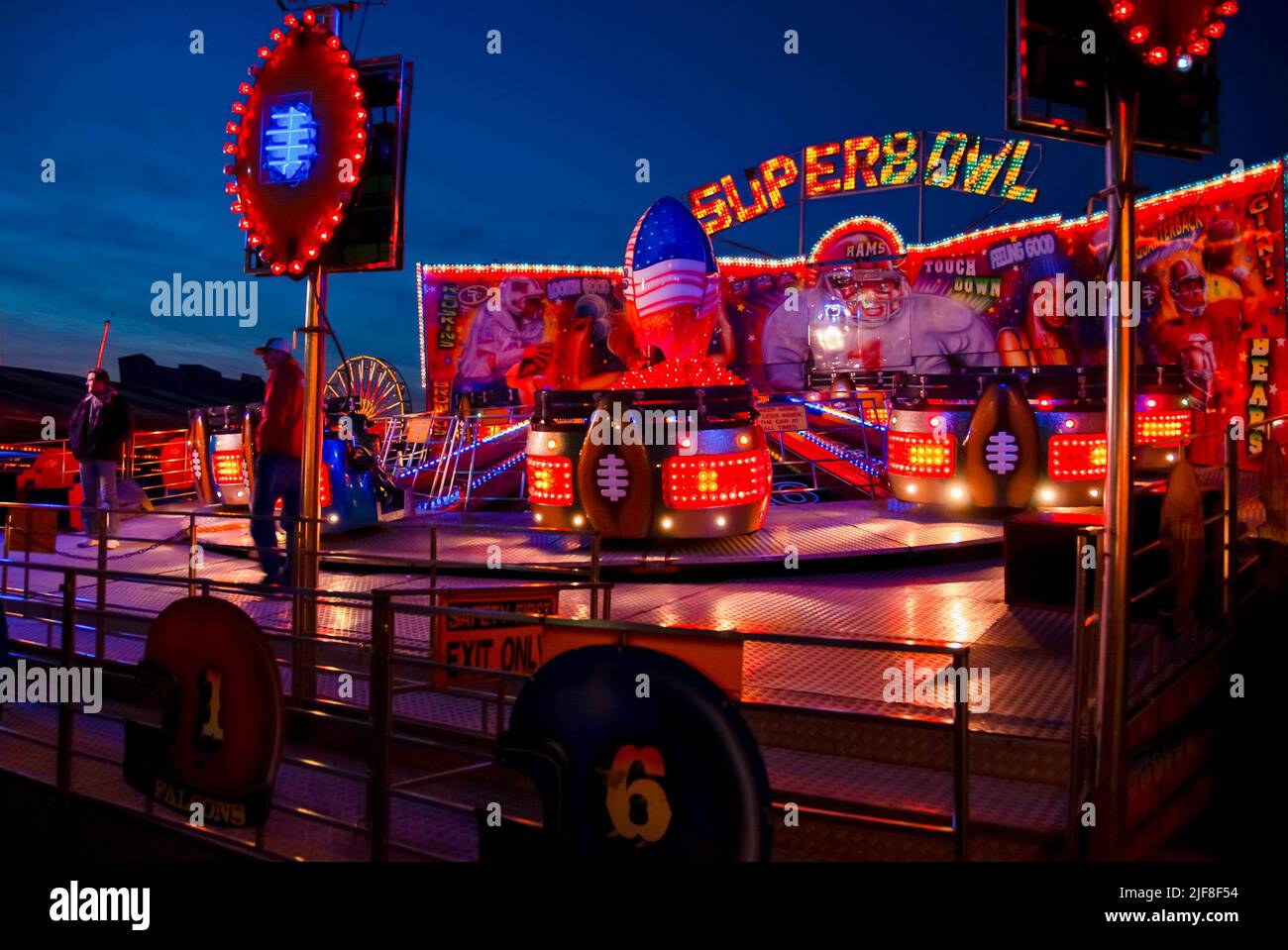 Fairground rides at night Stock Photo - Alamy