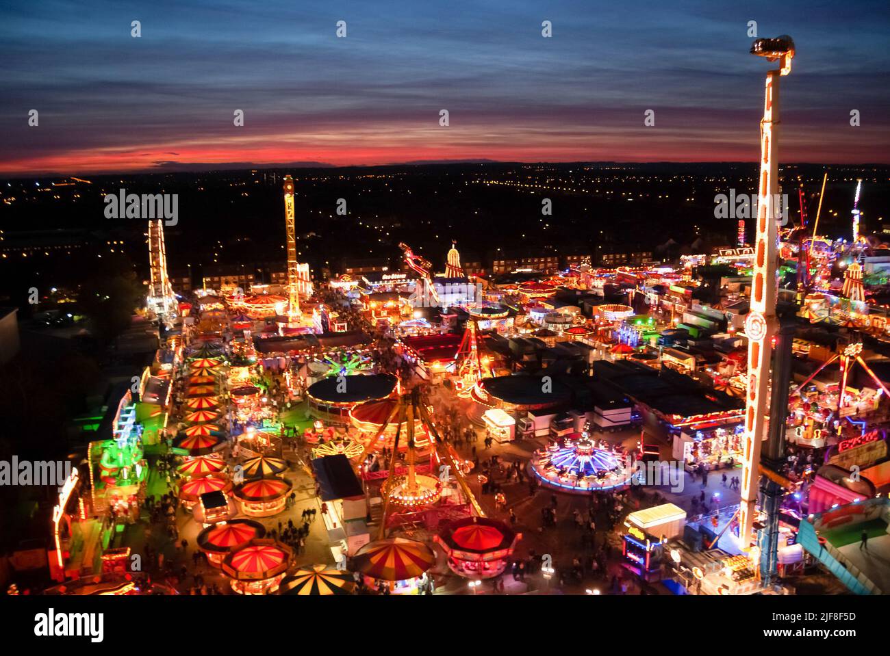 Fairground rides at night hi-res stock photography and images - Alamy