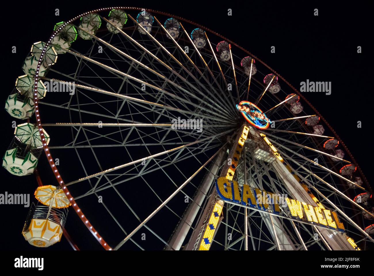 Fairground rides at night Stock Photo - Alamy