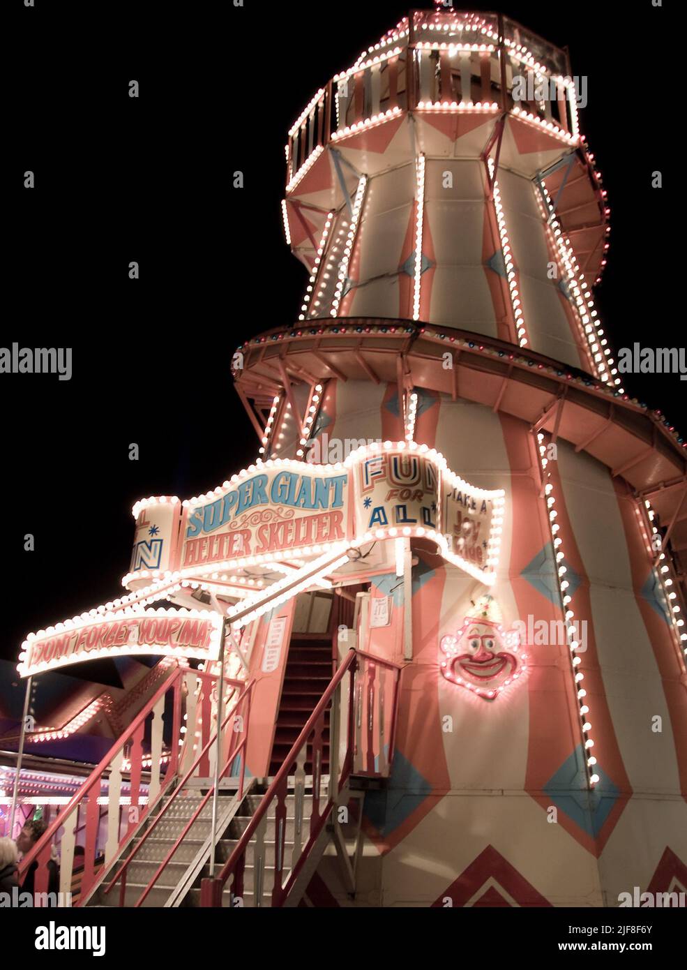 Fairground rides at night Stock Photo - Alamy