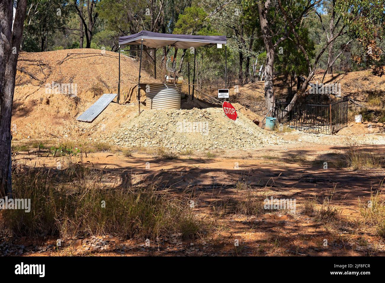 Canopy above underground digging for sapphires on a mining lease at ...