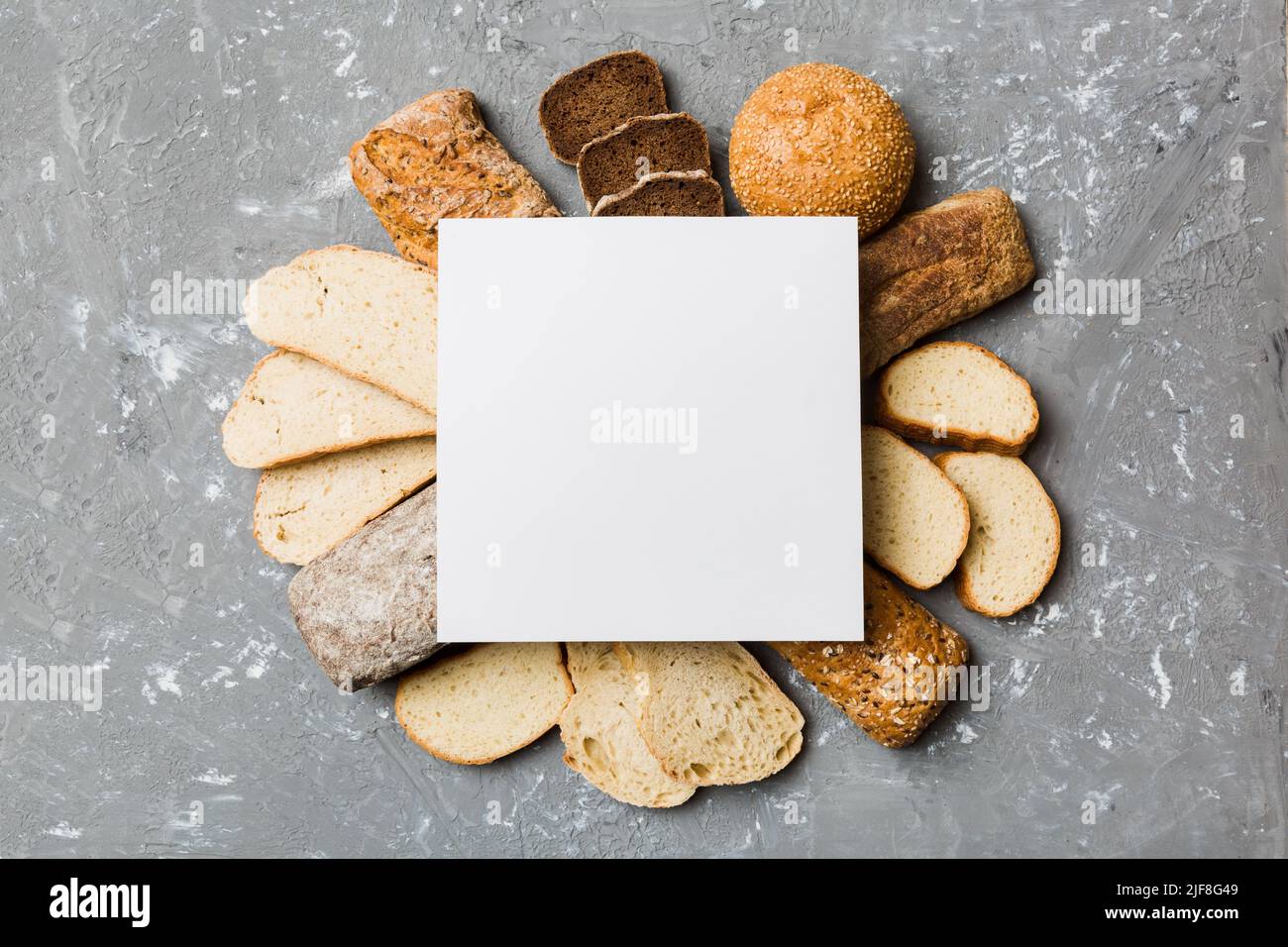 Minimalist paper blank mockup on background of Types of homemade bread ...