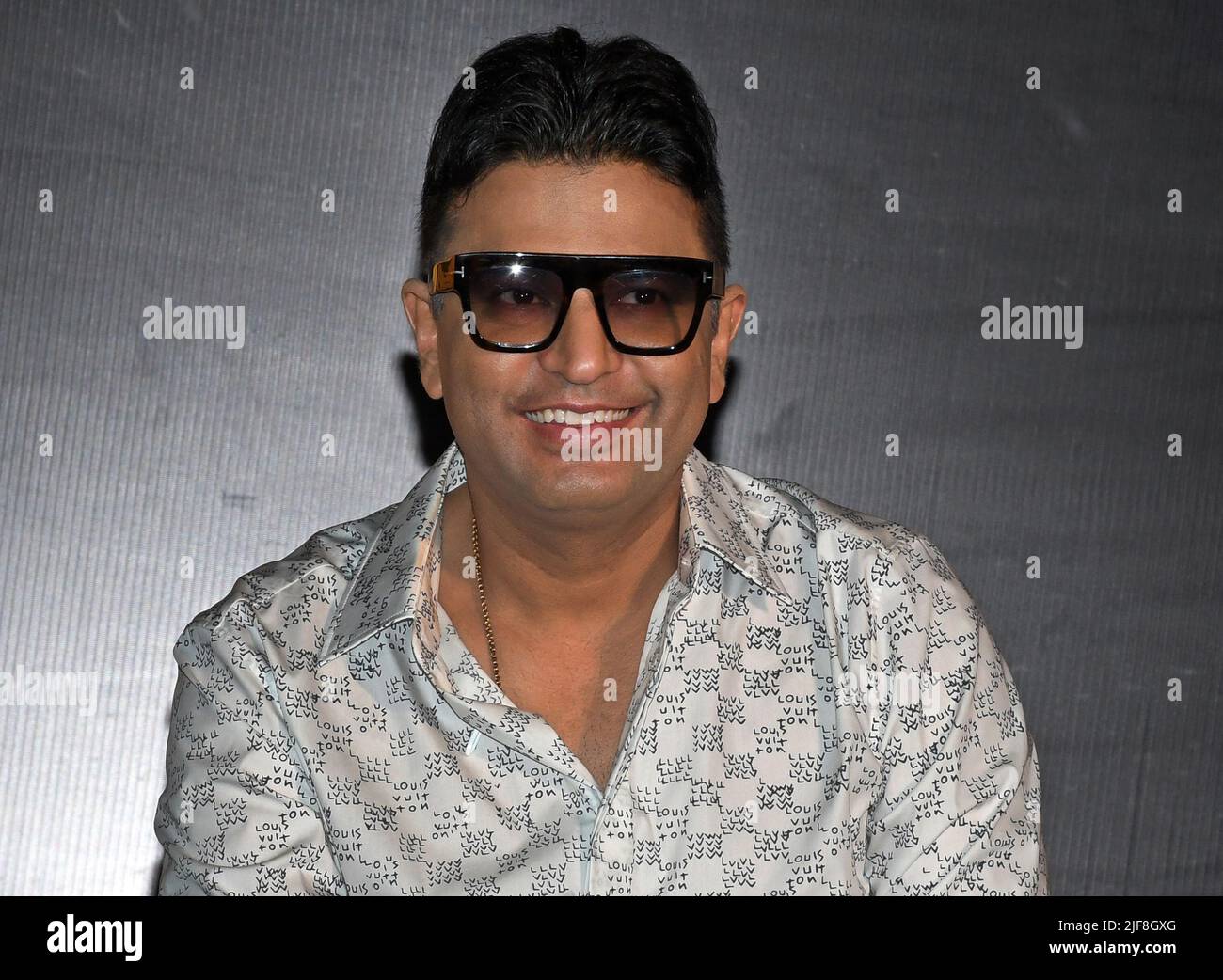 Bollywood producer Bhushan Kumar smiles during the trailer launch of ...