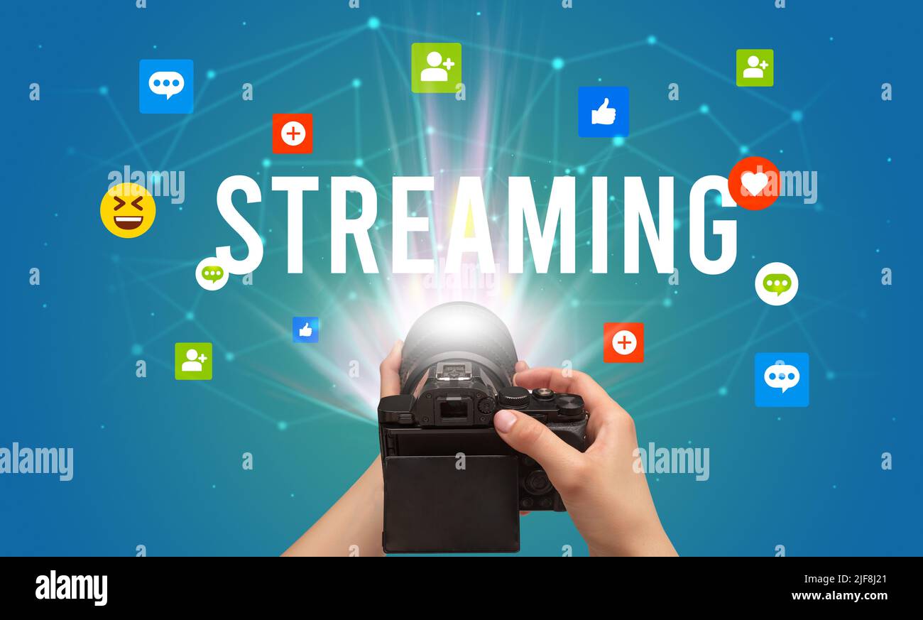 Using camera to capture social media content Stock Photo - Alamy