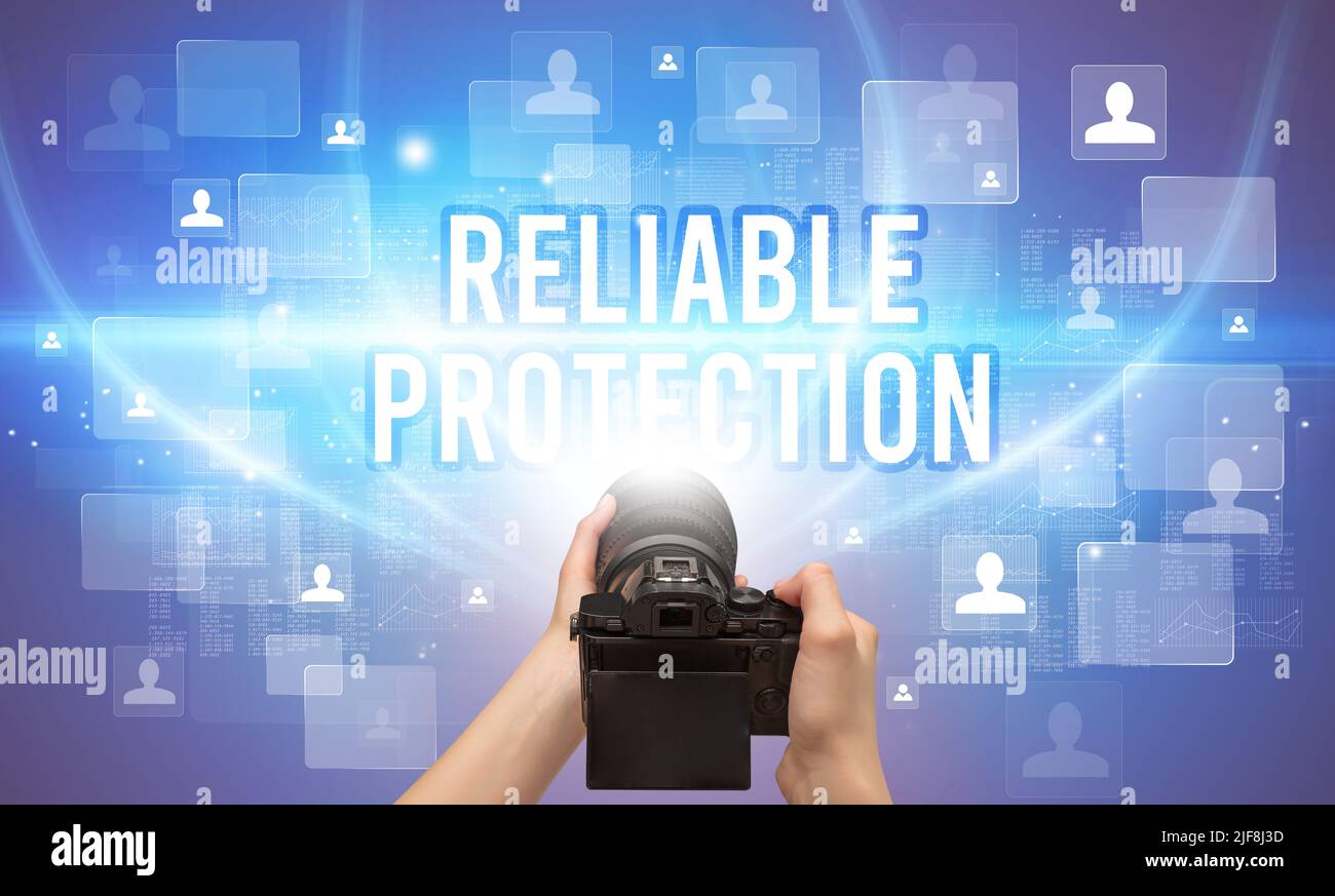 Close-up of hand holding camera Stock Photo - Alamy