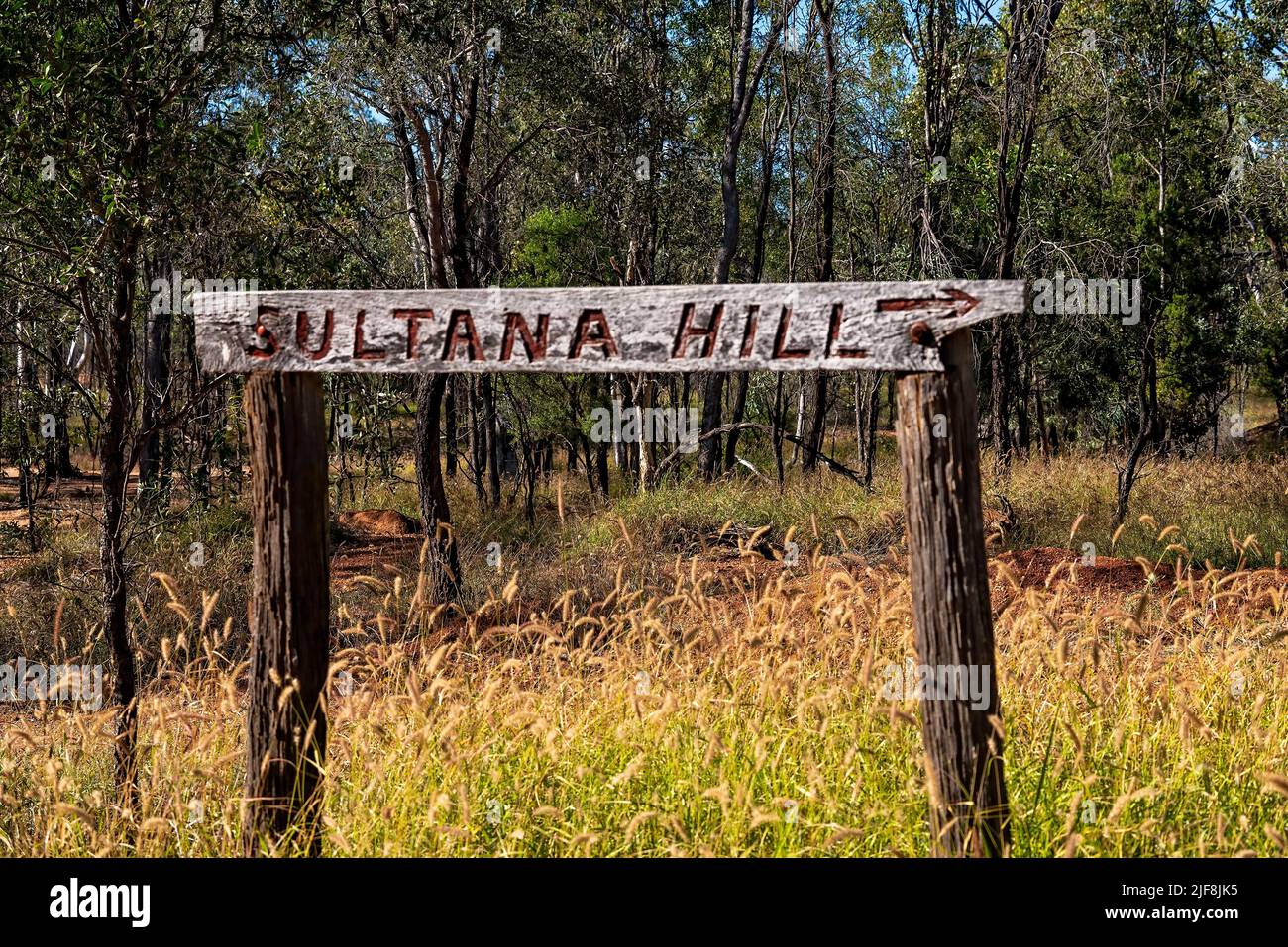 Sultana Hill hand carved sign in the bush at Rubyvale Australia Stock ...