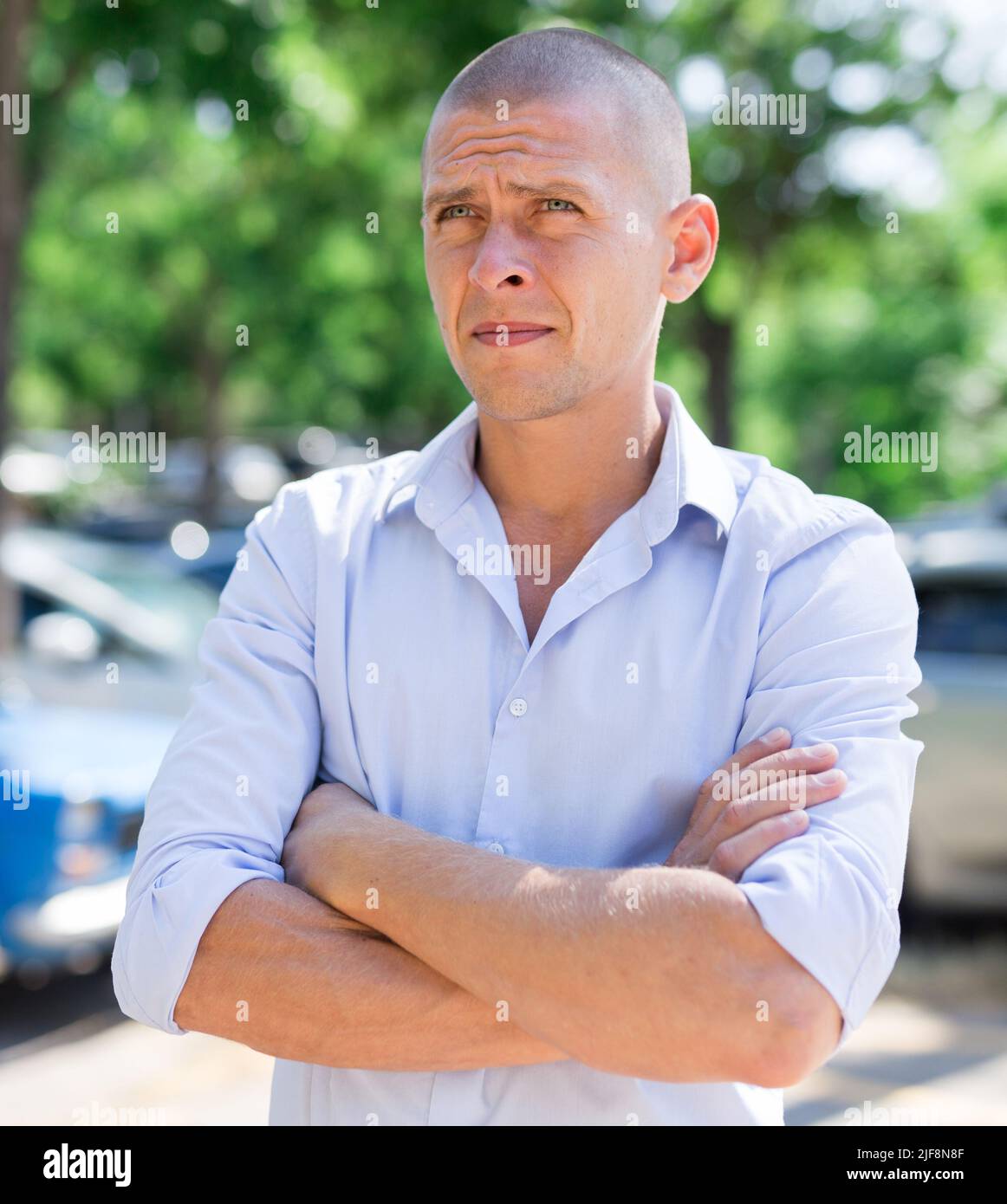 European man standing outside Stock Photo - Alamy