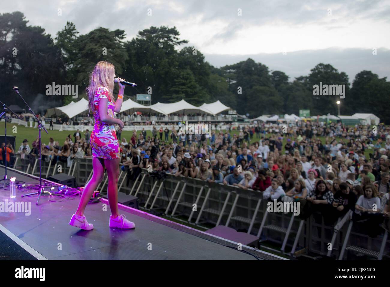 Katie Kittermaster performs on stage as the opening artist for Olly ...
