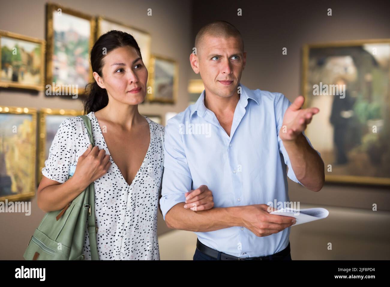 couple admiring art work Stock Photo - Alamy