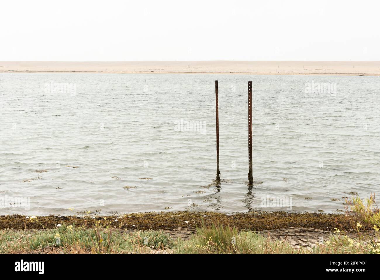 Metallic structure in water Stock Photo - Alamy