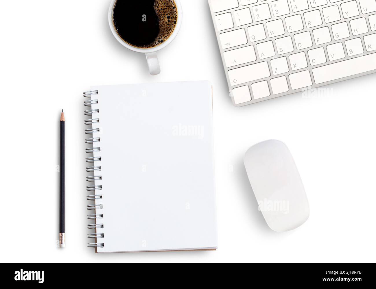 Top view with keyboard,mouse wireless,blank notebook or notepad and cup ...