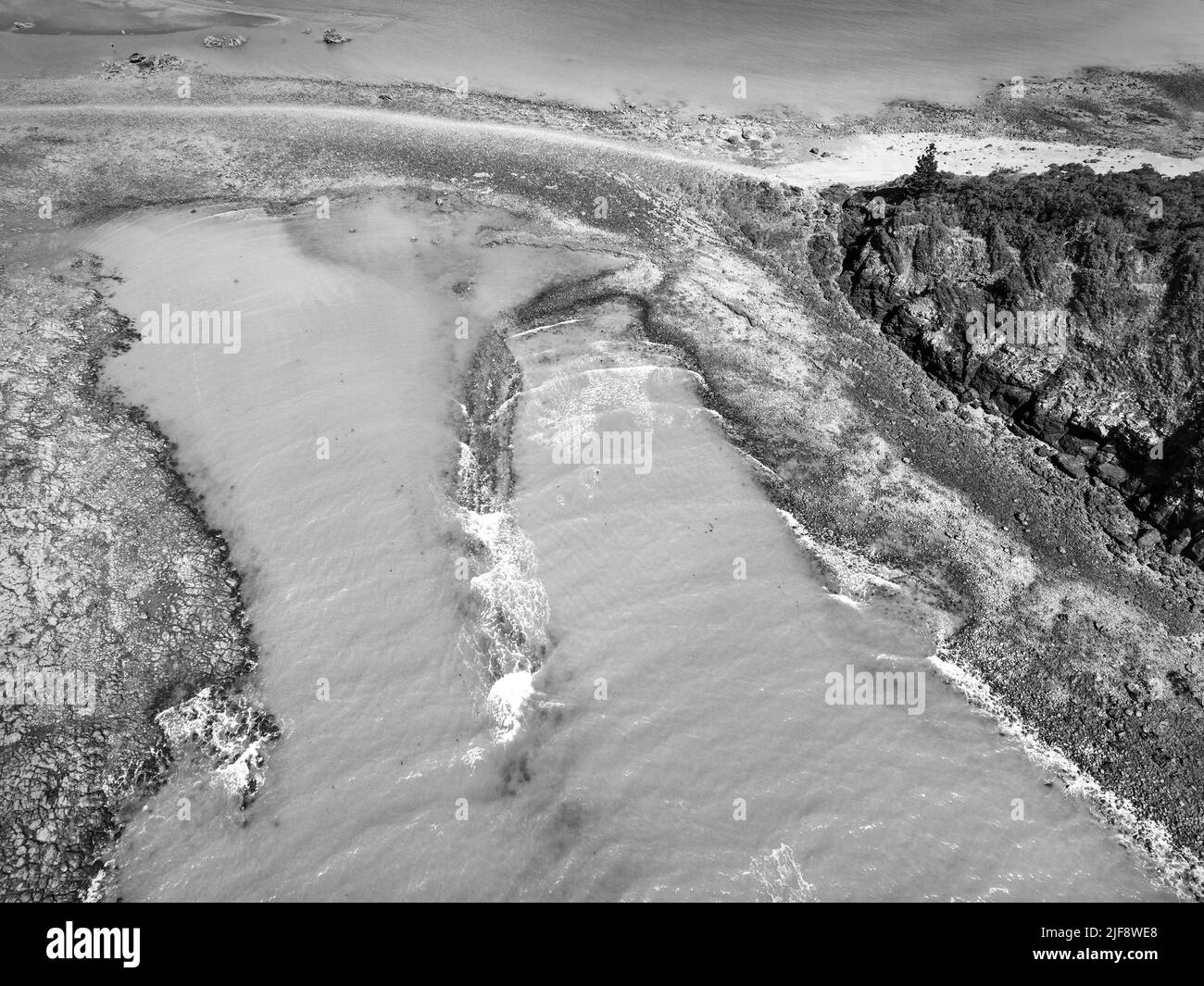 Drone aerial of incoming tide beside a beach walking track at Cape ...