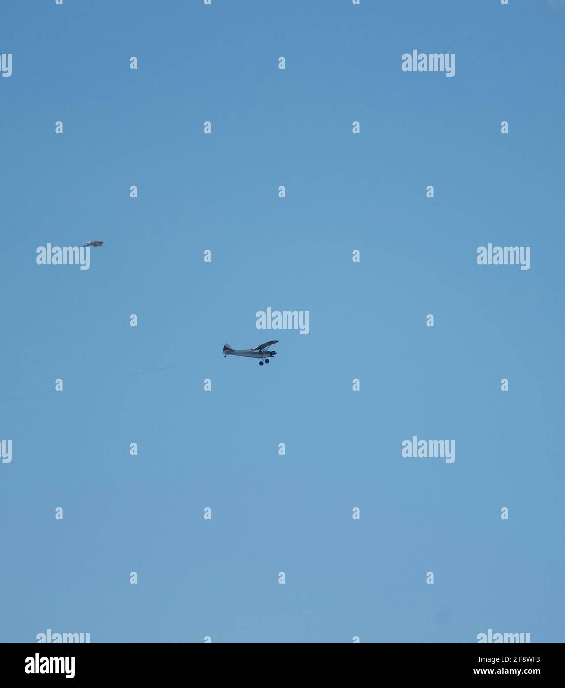 Photo of a plane passing through the skies of Windsor Stock Photo - Alamy