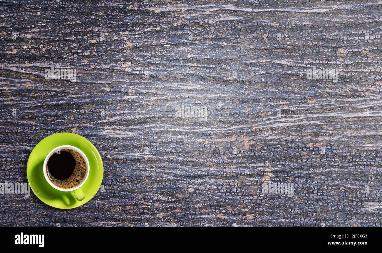 Cup of coffee on wooden table background with copy space for any design ...