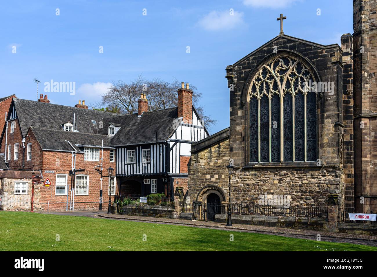 Part of St Mary de Castro Church along with a timbered building ...