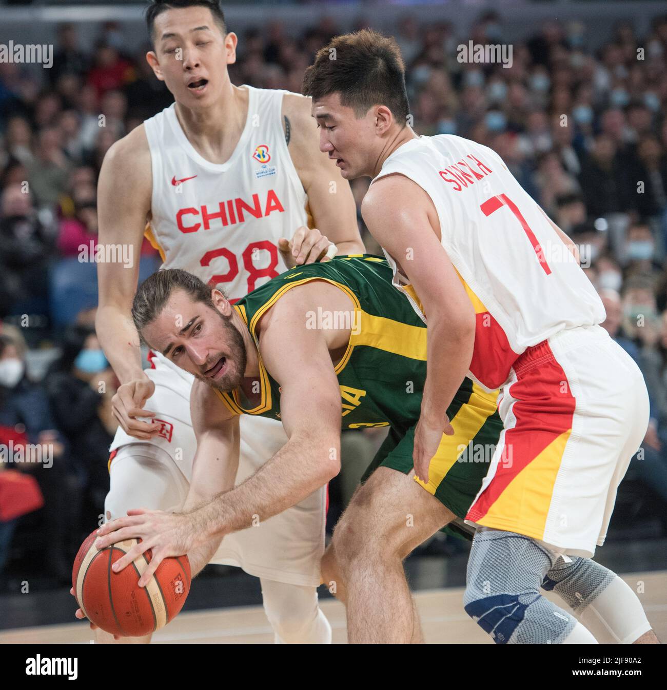 Sam Froling (M) of Australia Basketball team and Minghui Sun (R) of ...
