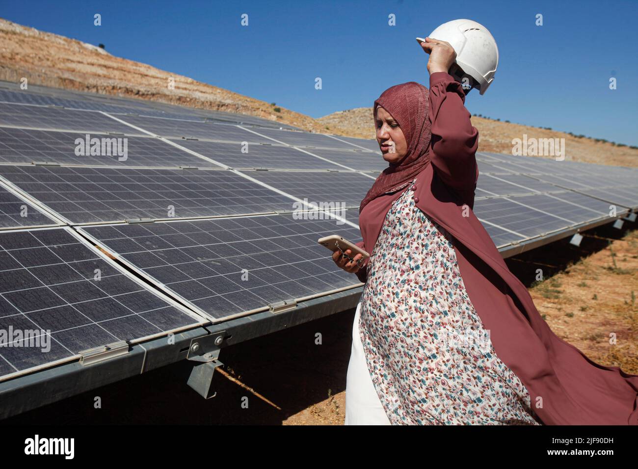 Jordan Valley, Palestine. 30th June, 2022. A Palestinian engineer works ...