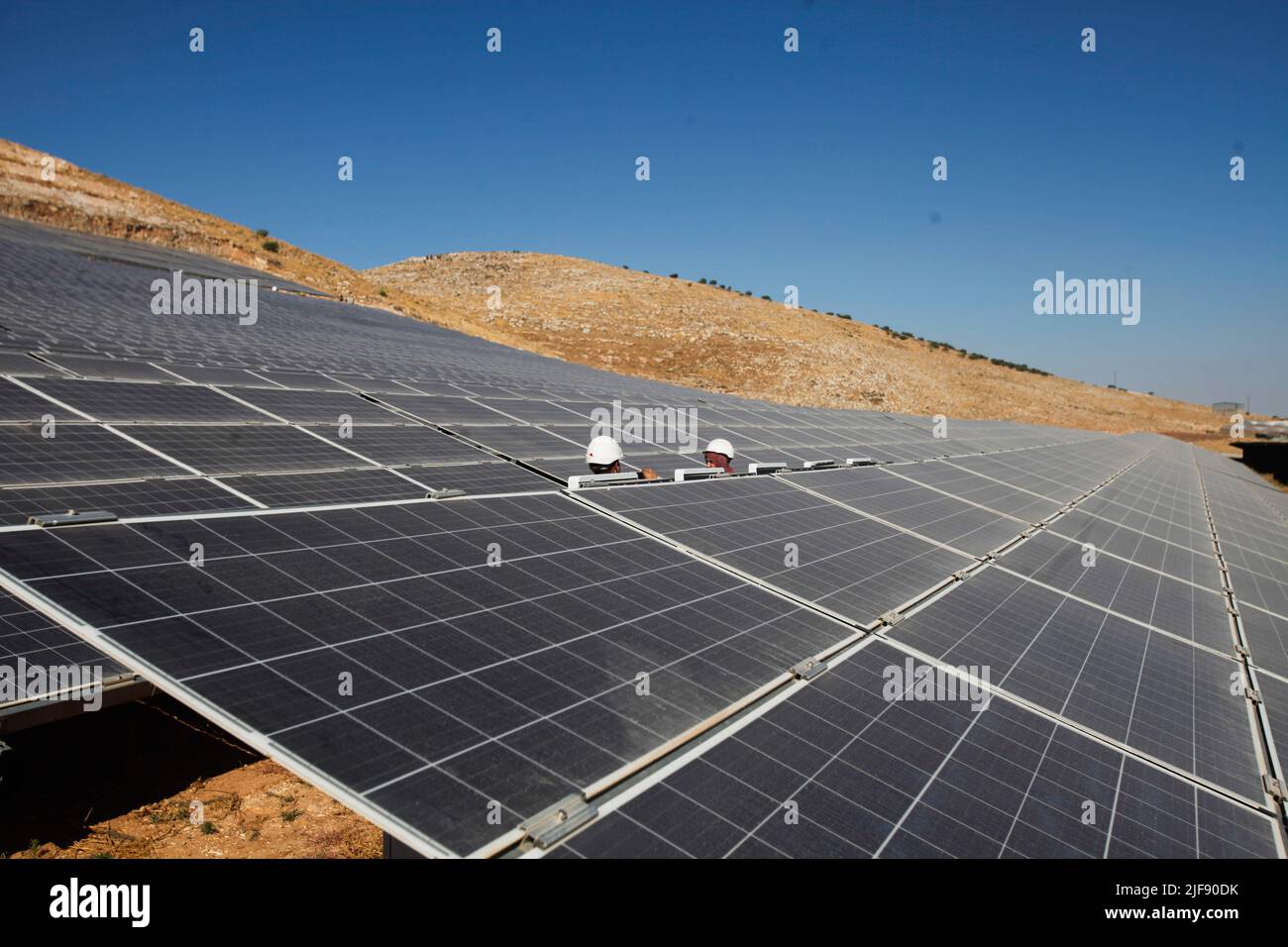 Jordan Valley, Palestine. 30th June, 2022. Palestinian engineers work ...