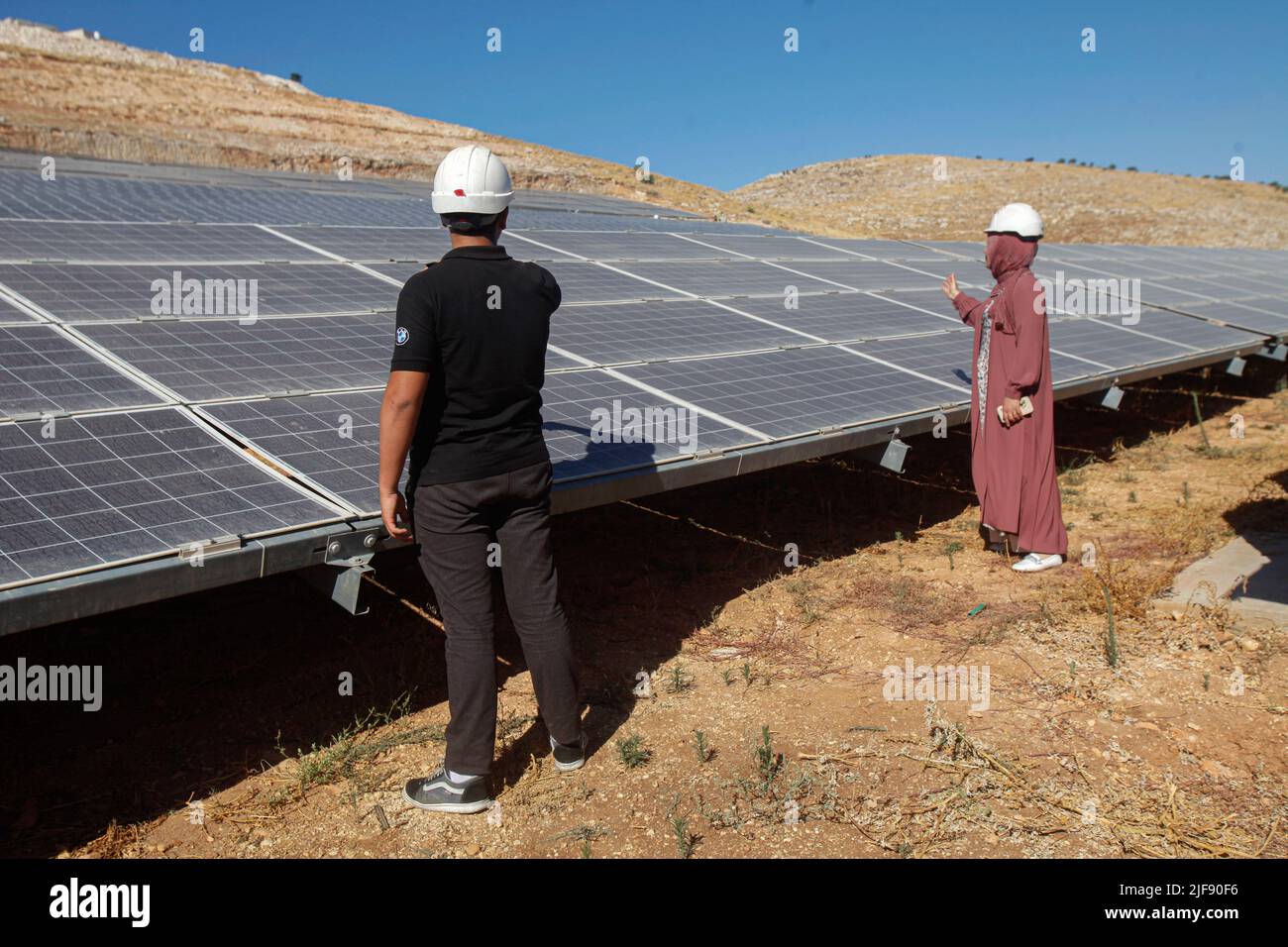 Jordan Valley, Palestine. 30th June, 2022. Palestinian engineers work ...