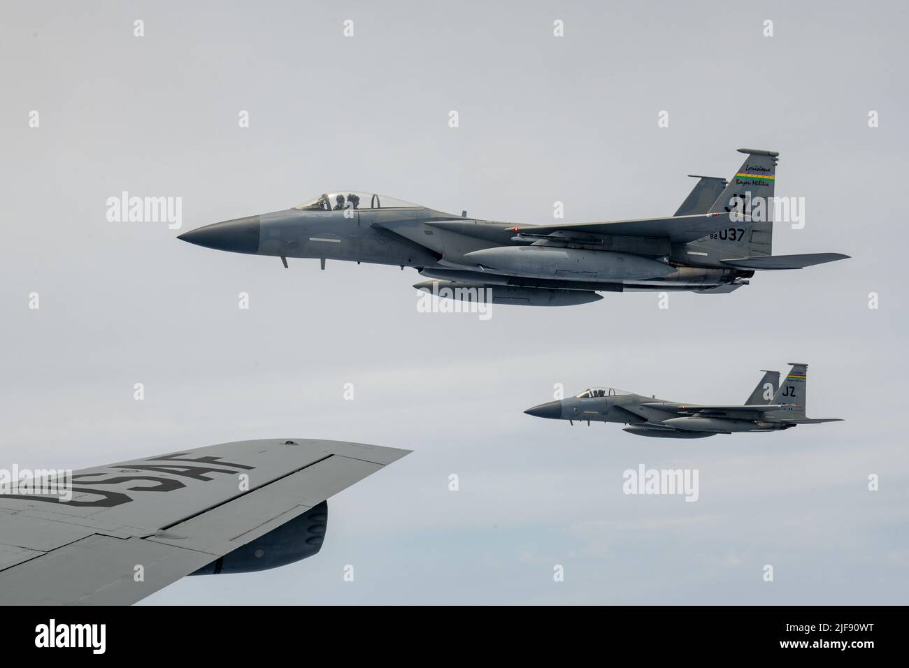 Two U.S. Air Force F-15C Eagles from the Louisiana Air National Guard's 159th Fighter Wing fly ...