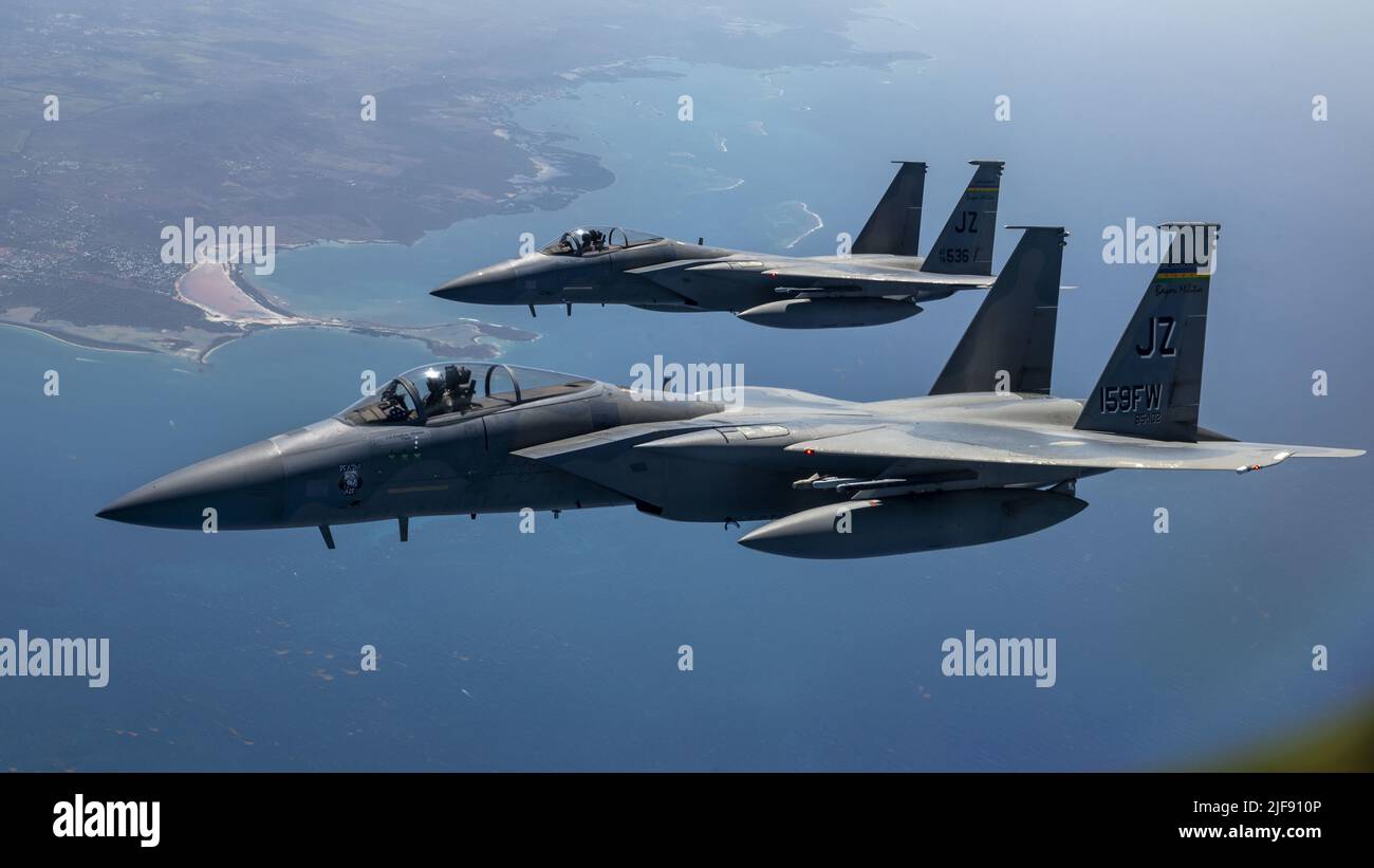 Two U.S. Air Force F-15C Eagles from the Louisiana Air National Guard's 159th Fighter Wing fly ...