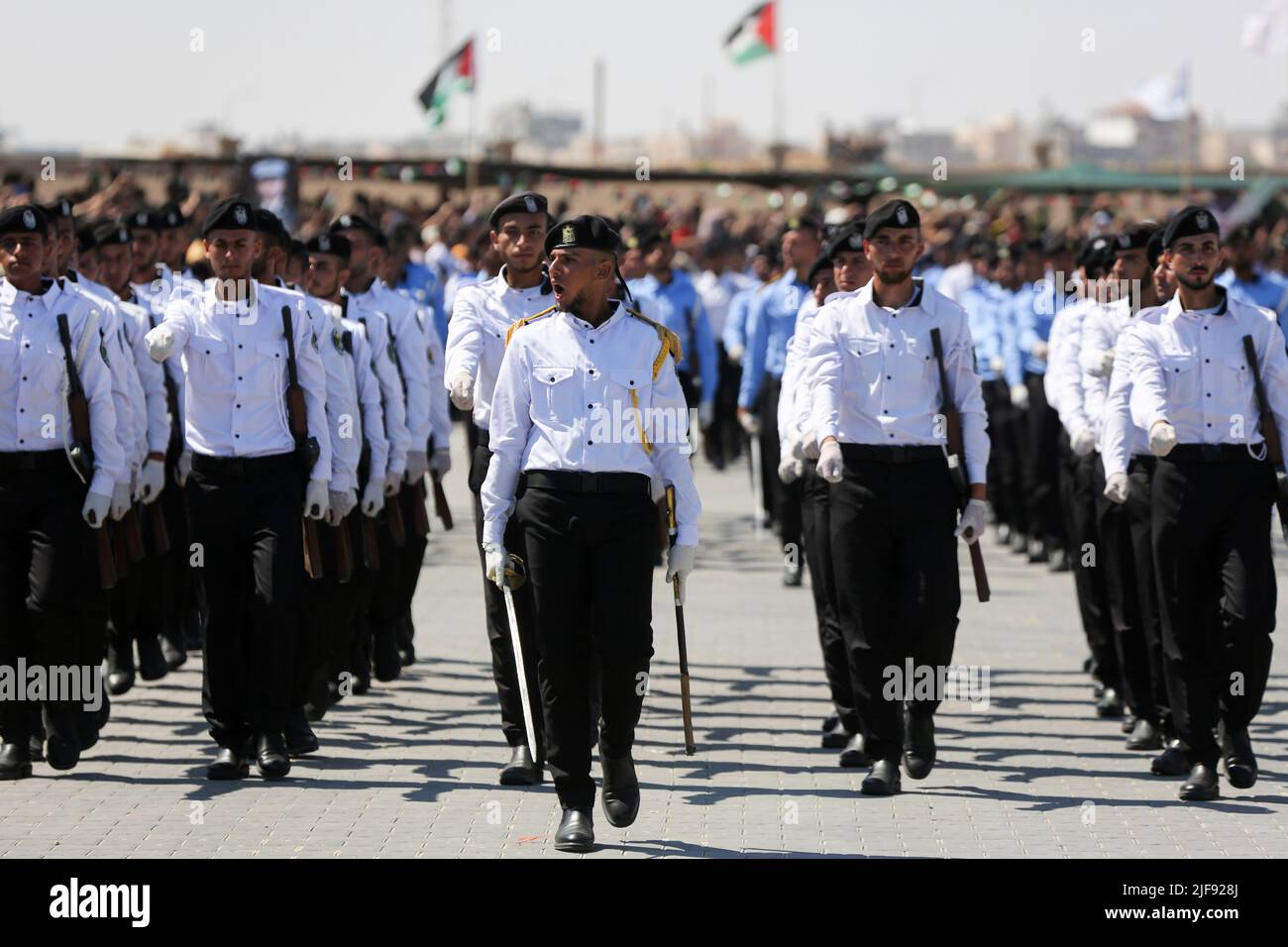 Palestinian Police officers take part during a graduation ceremony. The ...