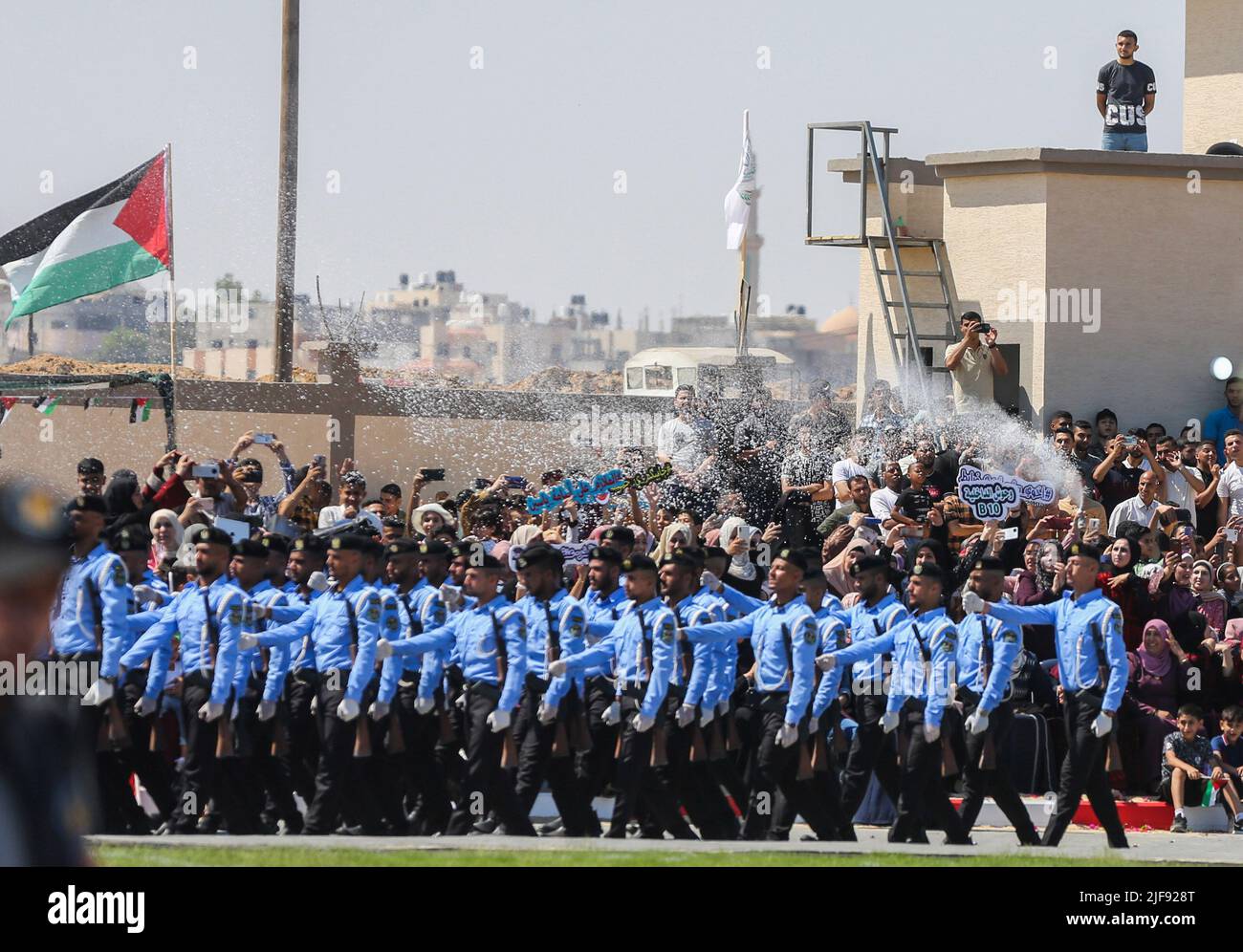 Palestinian Police officers take part during a graduation ceremony. The ...