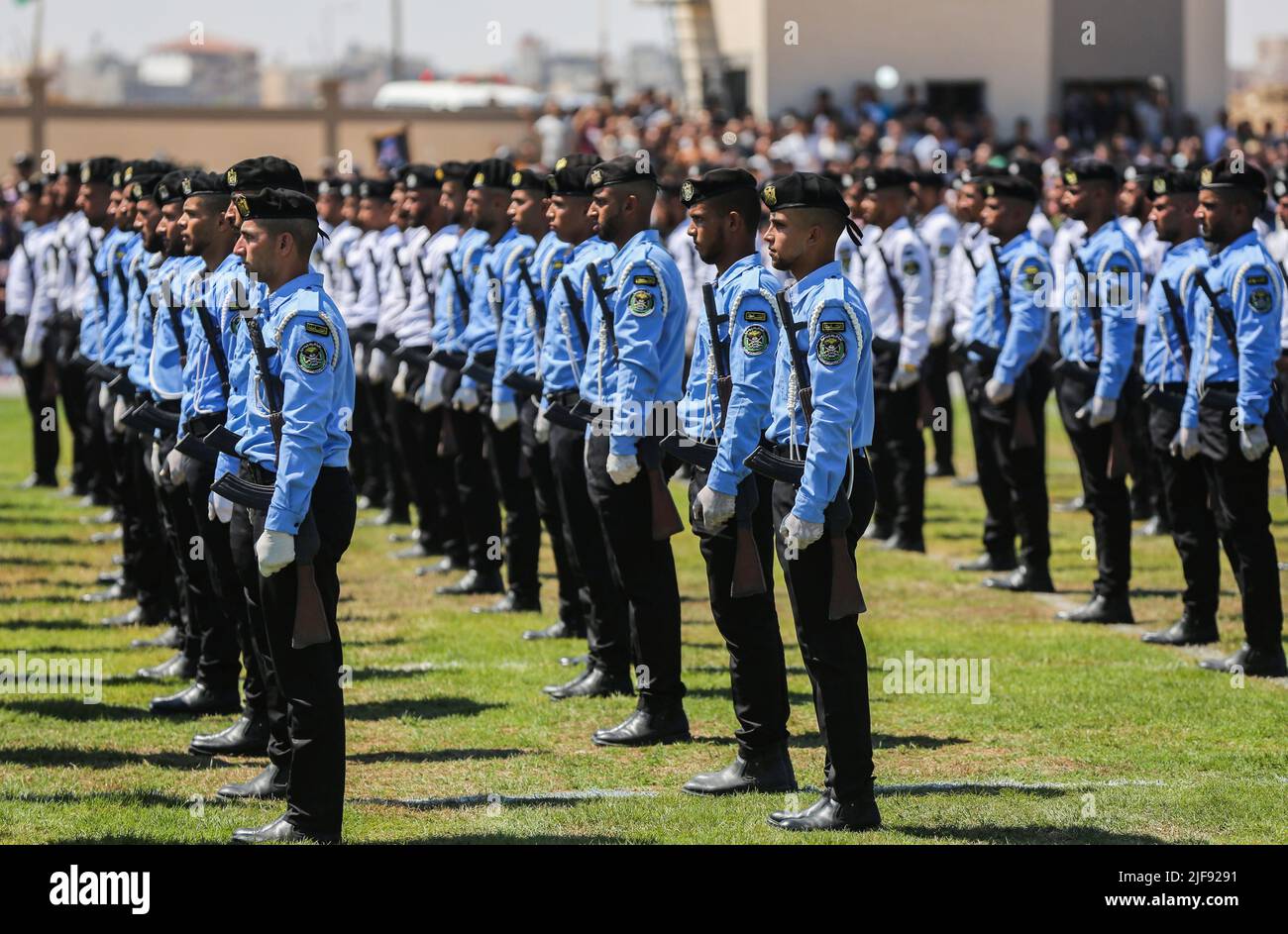 Palestinian Police officers take part during a graduation ceremony. The ...