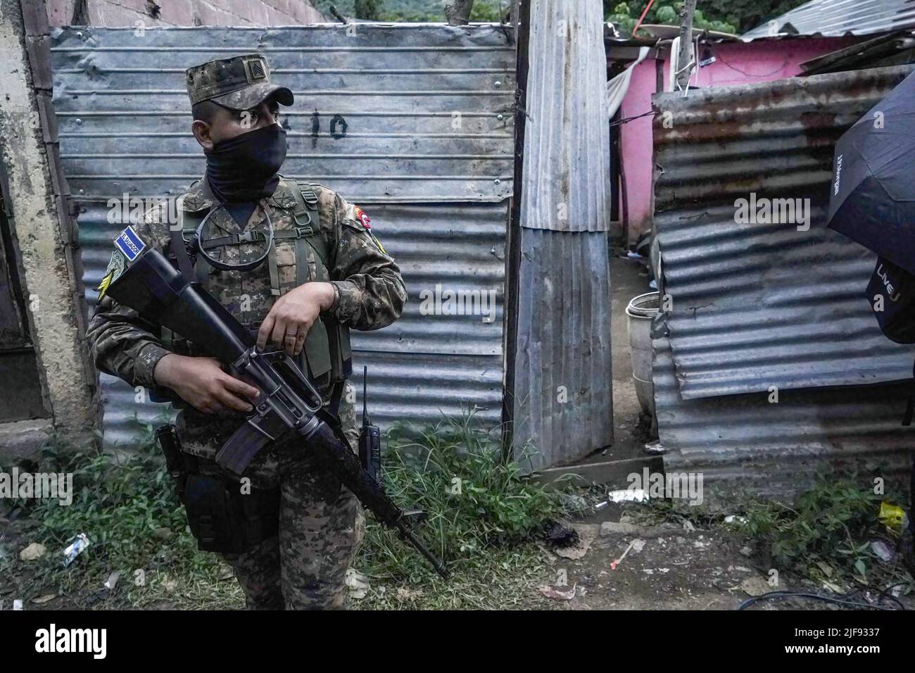 Santa Ana, El Salvador. 30th June, 2022. A soldier looks on while ...