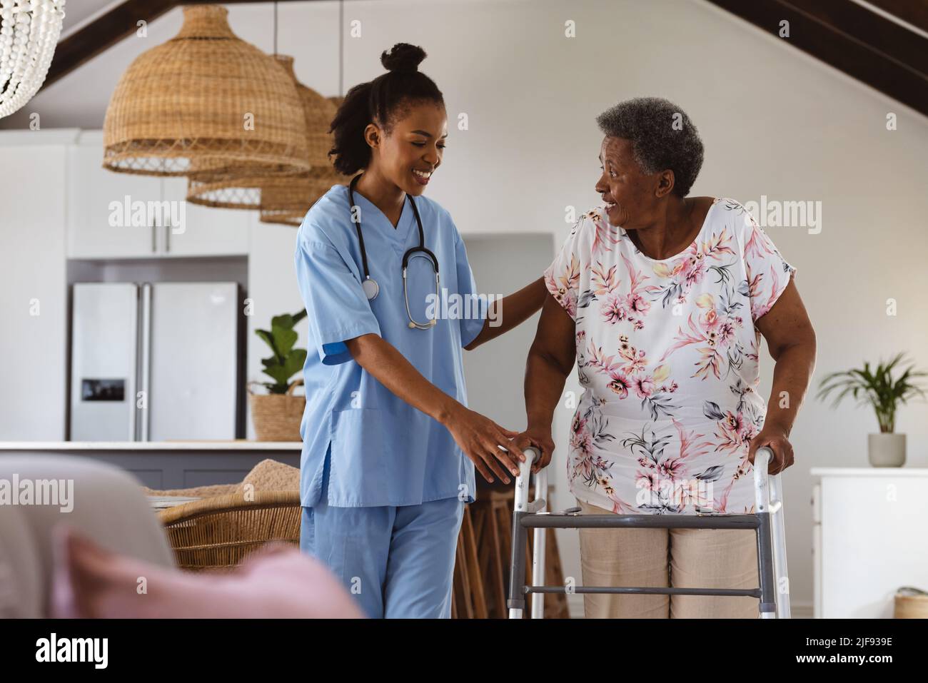 Portrait smiling doctor assisting patient hi-res stock photography and ...