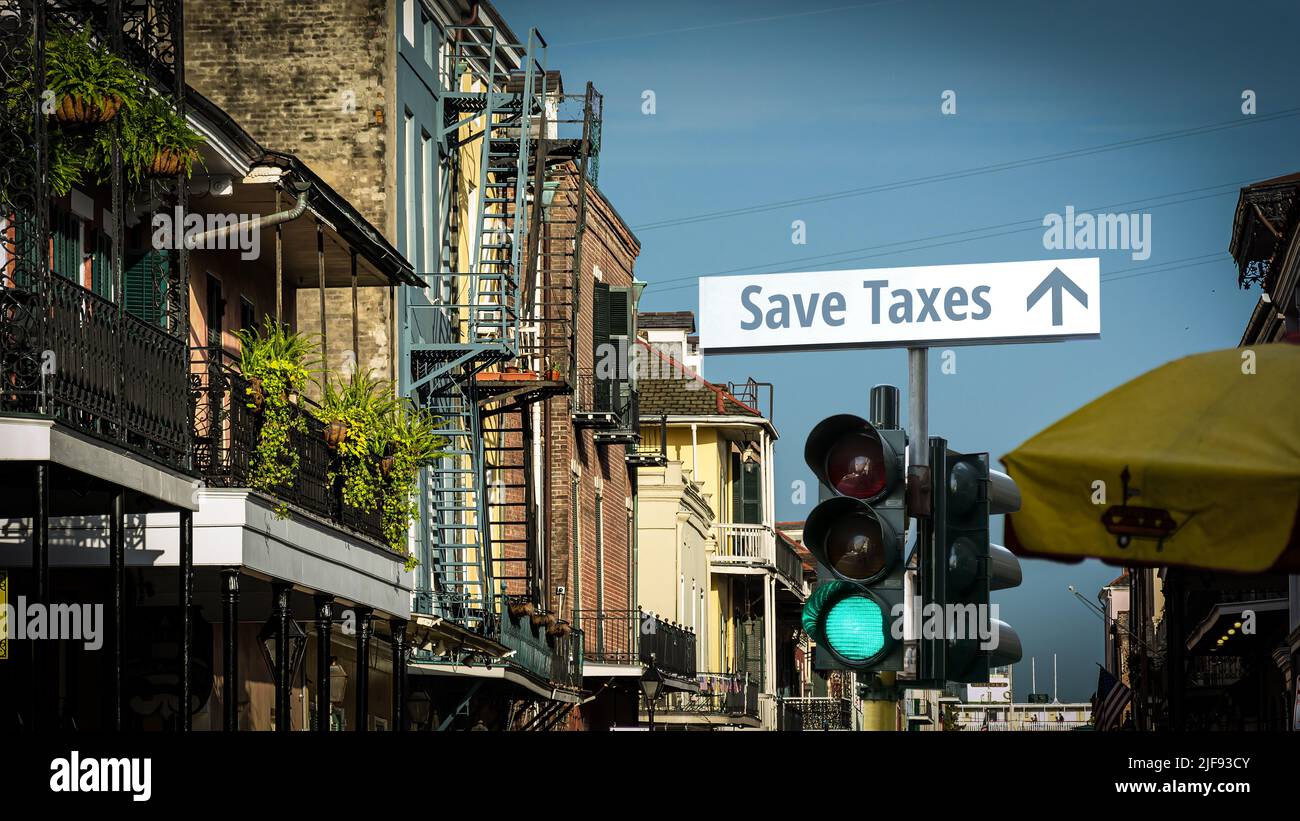 Street Sign the Direction Way to Save Taxes Stock Photo - Alamy
