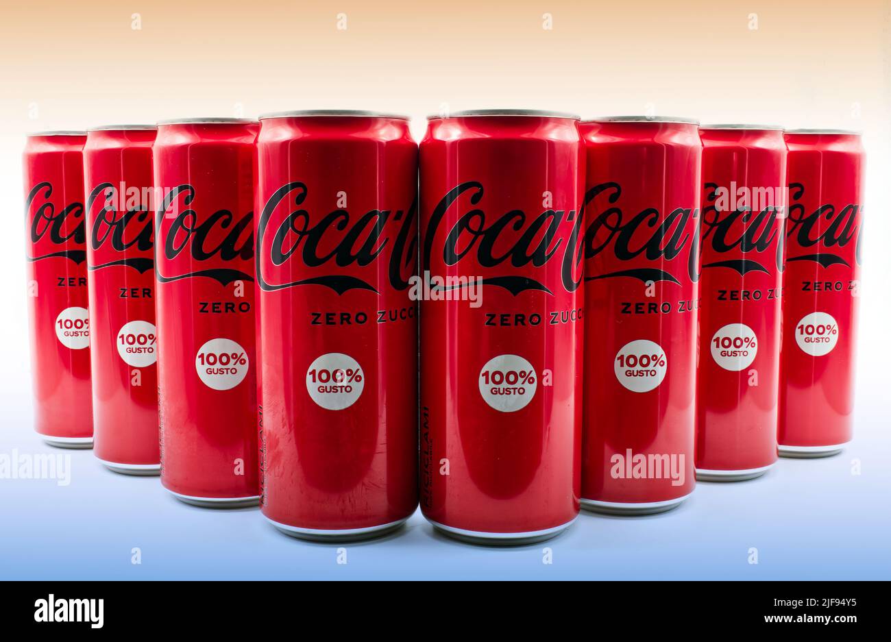 Can of Coca Cola isolated on colored background Stock Photo - Alamy